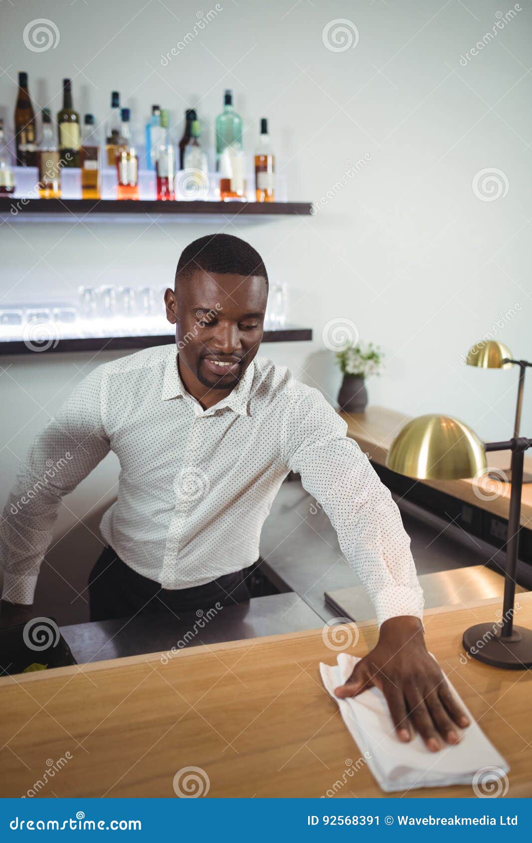 Bar Tender Cleaning Bar Counter in Restaurant Stock Image - Image of ...