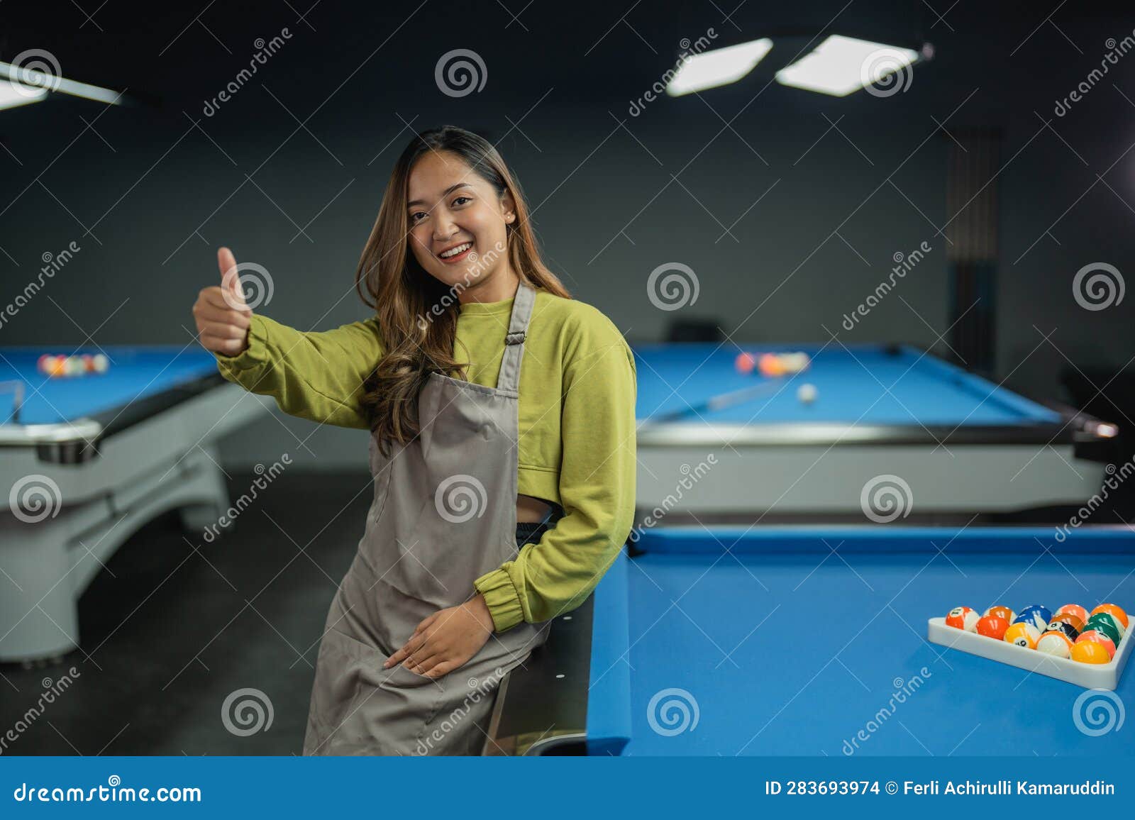 Bar Worker Thumb Up while Standing on the Pool at the Billiard Studio ...