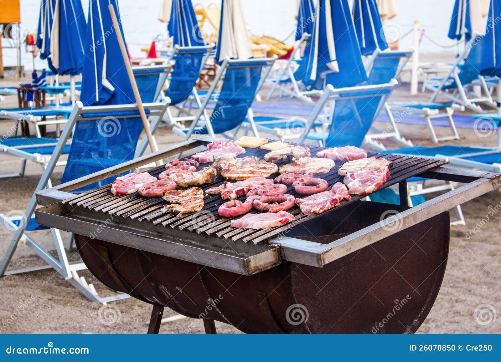 Barbecue on the beach stock photo. Image of grilling - 26070850