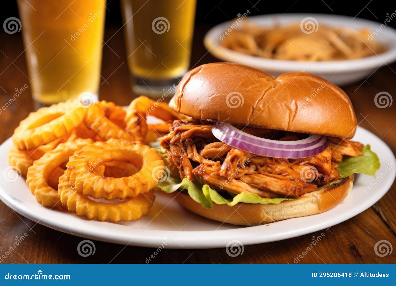 Barbecue Chicken Sandwich with a Side of Onion Rings Stock Photo ...