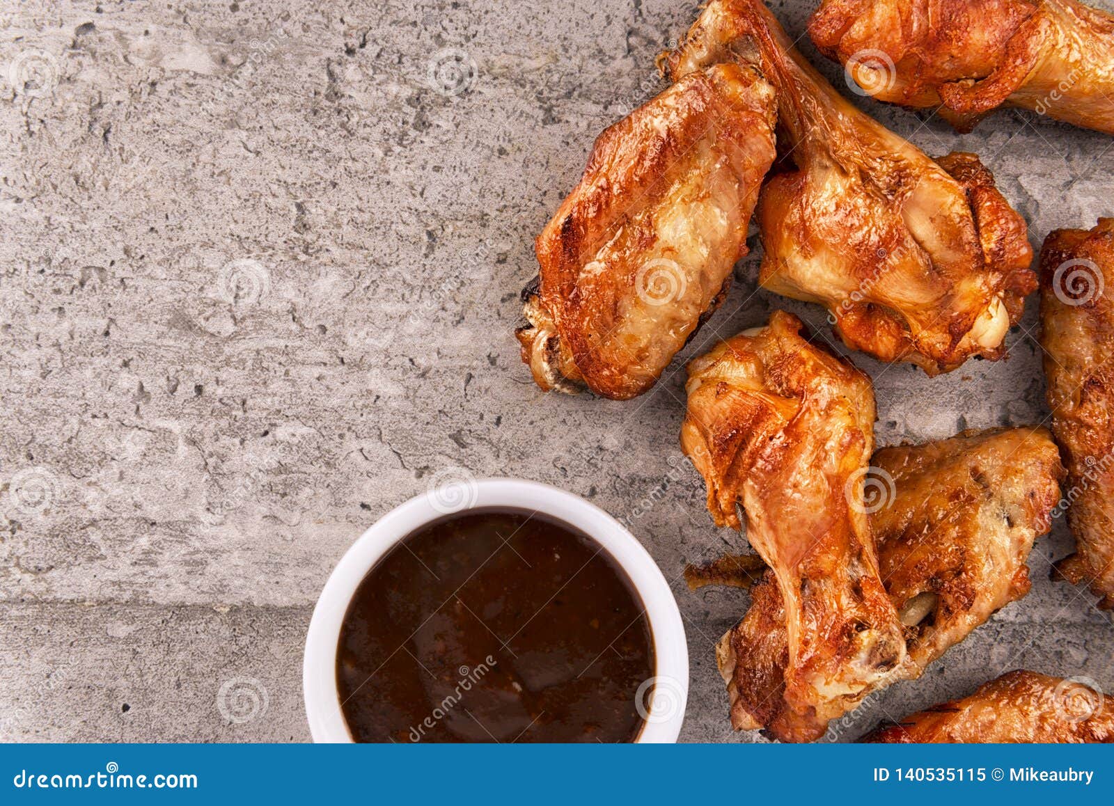 Barbecue Chicken Wings on a Concrete Texture in Background. Stock Image ...