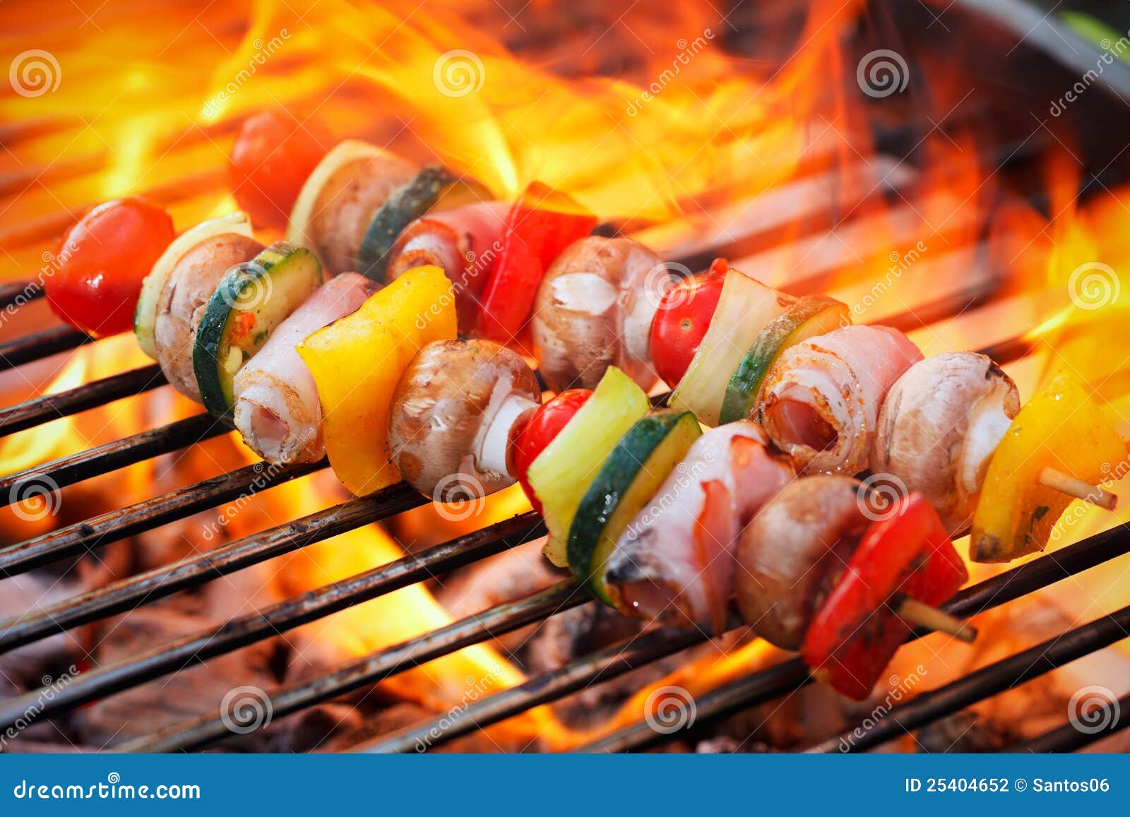Barbecue with Flames and Vegetable Spit Stock Photo - Image of blazing ...