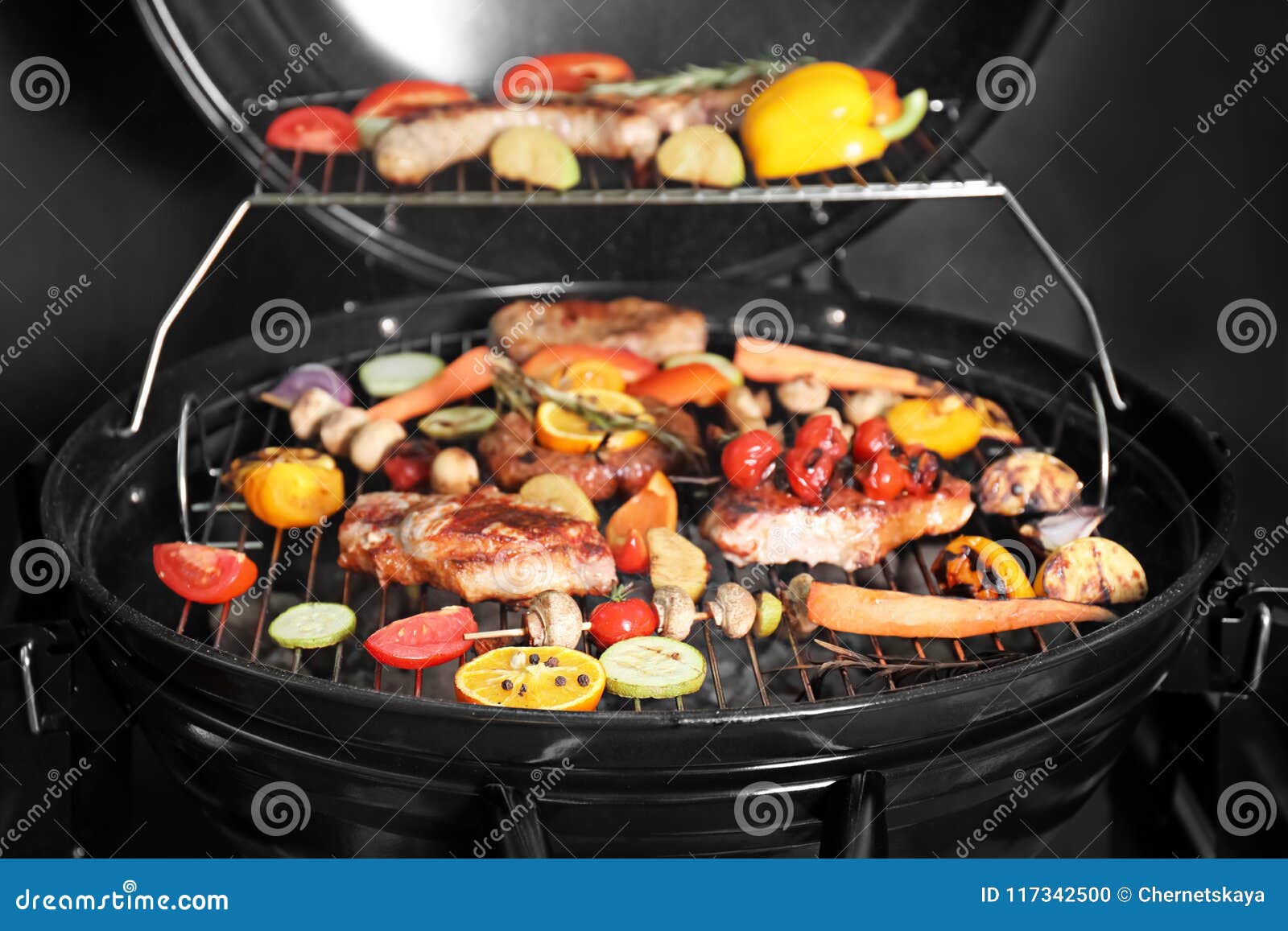 Barbecue Grill with Delicious Cooked Meat Stock Photo - Image of flame ...