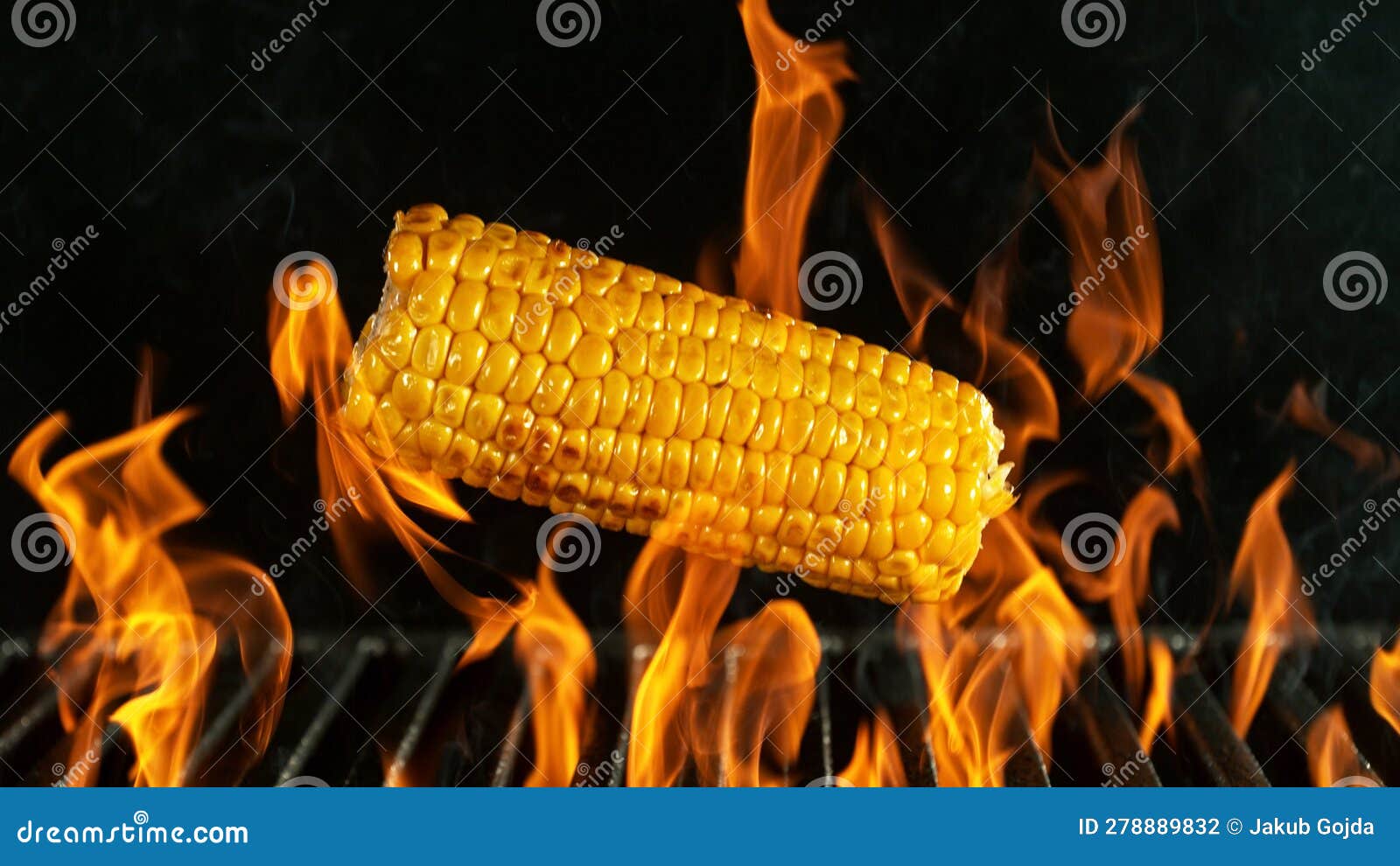 Barbecue Grill with Falling Corn Stock Photo - Image of grilling ...