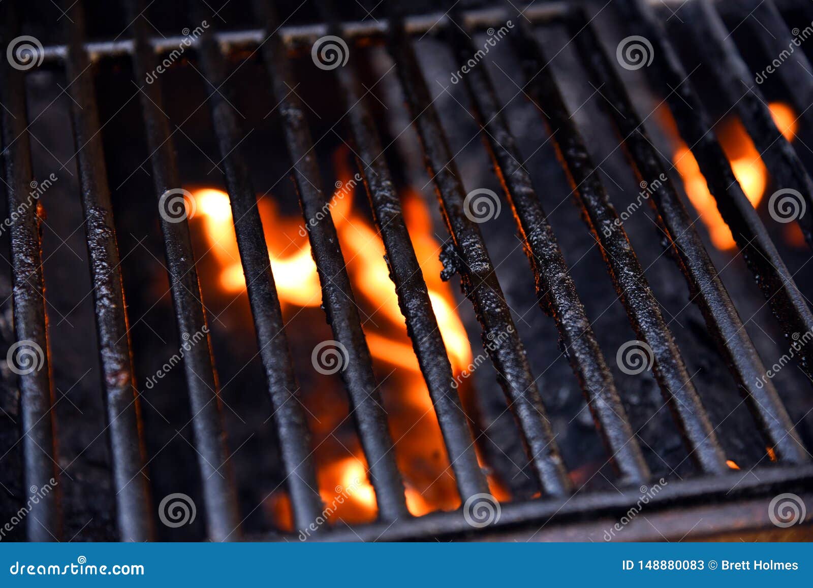 Barbecue grill with flames stock image. Image of grate - 148880083
