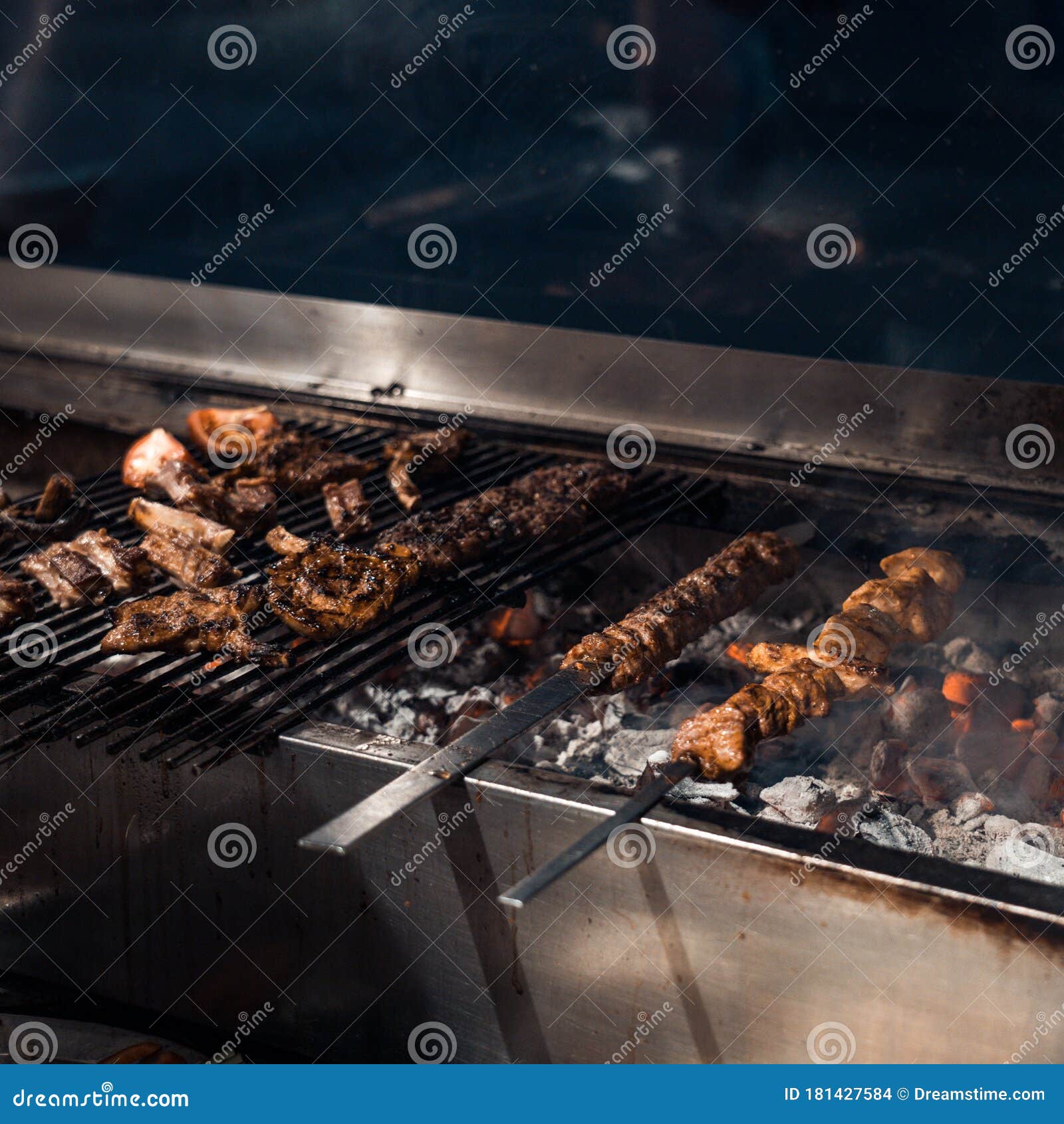 Barbecue, Grill and a Lot of Meat Stock Photo - Image of dark, cookout ...