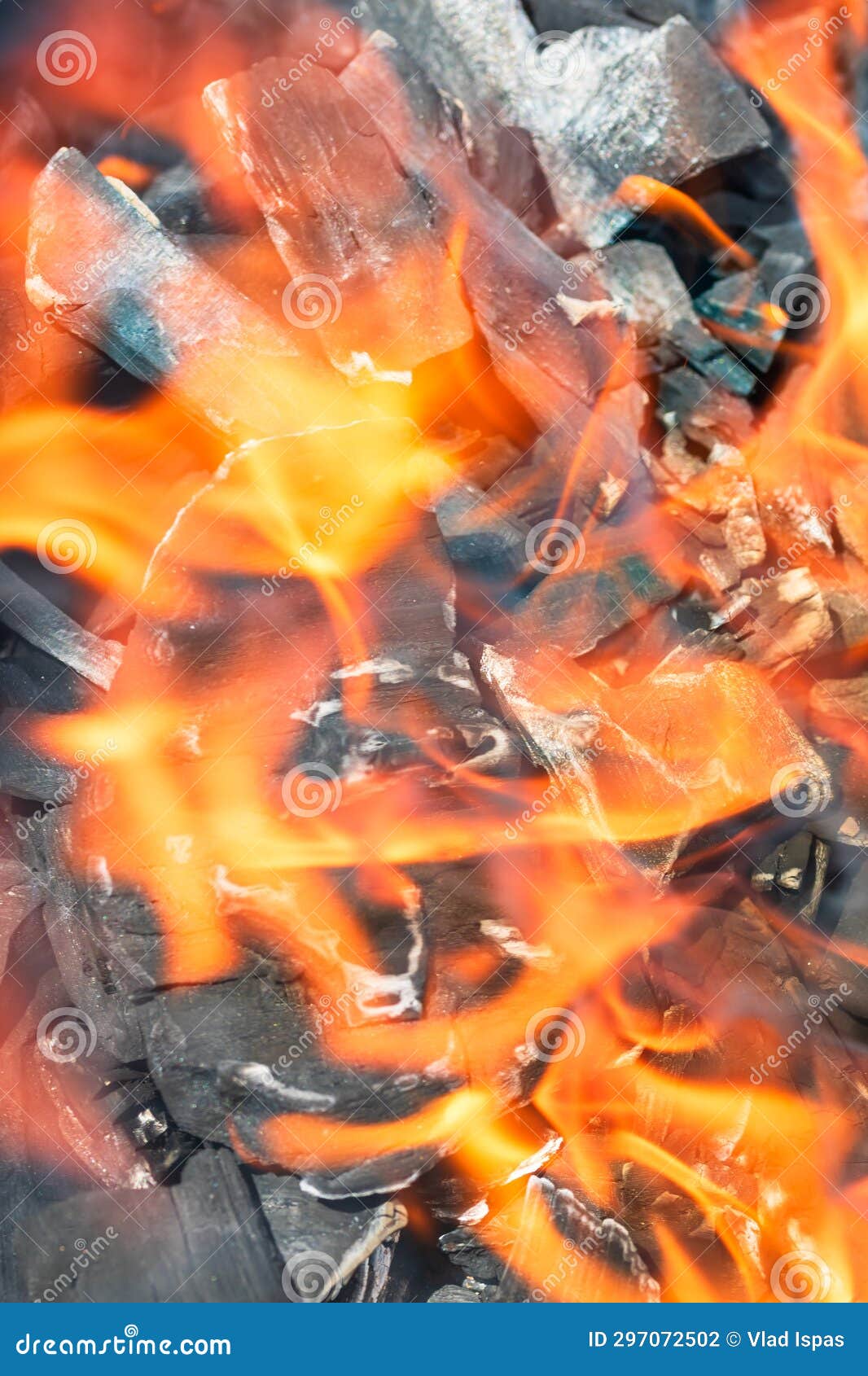 Barbecue Grill Pit With Glowing And Flaming Hot Open Fire With Red Flame Hot Charcoal