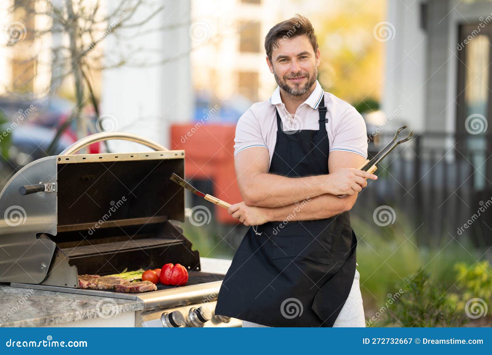 Barbecue Master. Middle Aged Hispanic Man in Apron for Barbecue ... Barbecue Master. Middle Aged Hispanic Man in Apron for Barbecue ...