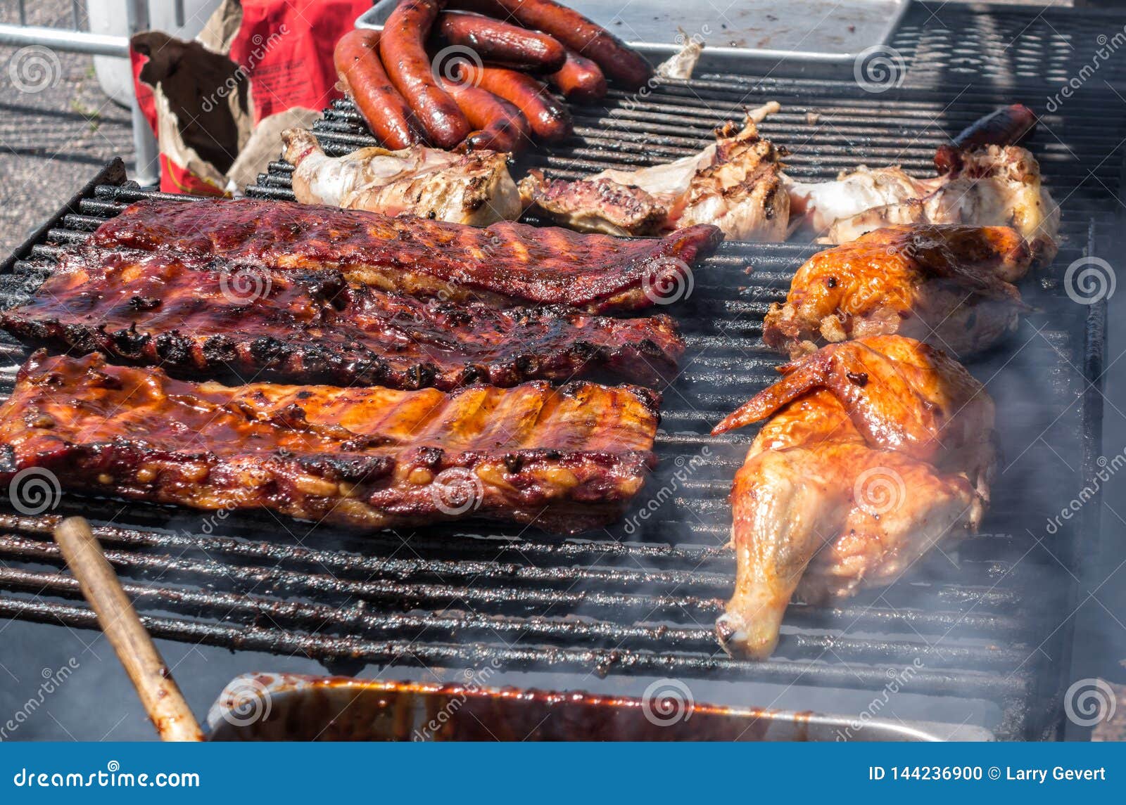 Barbecue with Ribs, Chicken and Sausage Stock Photo - Image of downtown ...