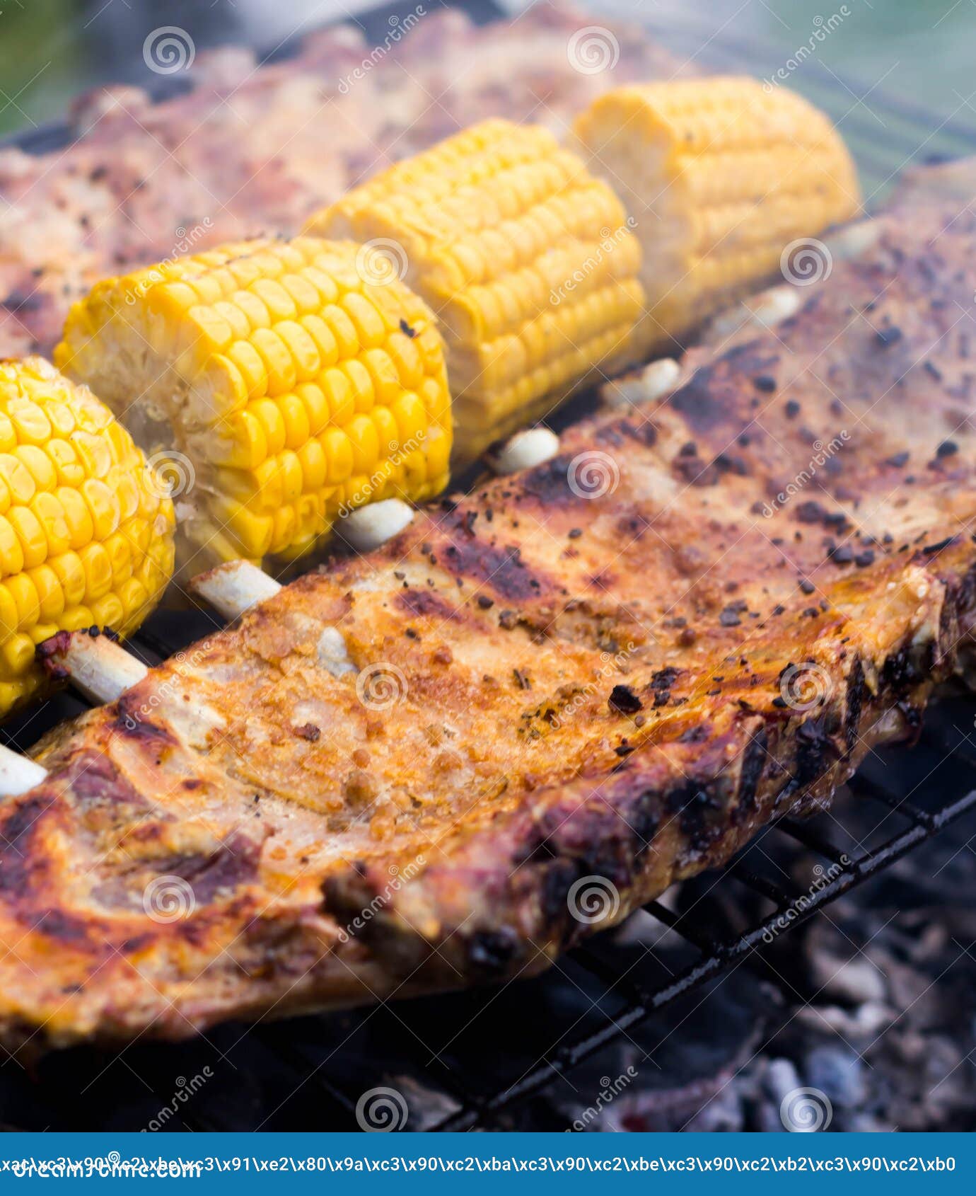 Barbecue Ribs with Corn Cobs on Fire Stock Photo - Image of cooking ...