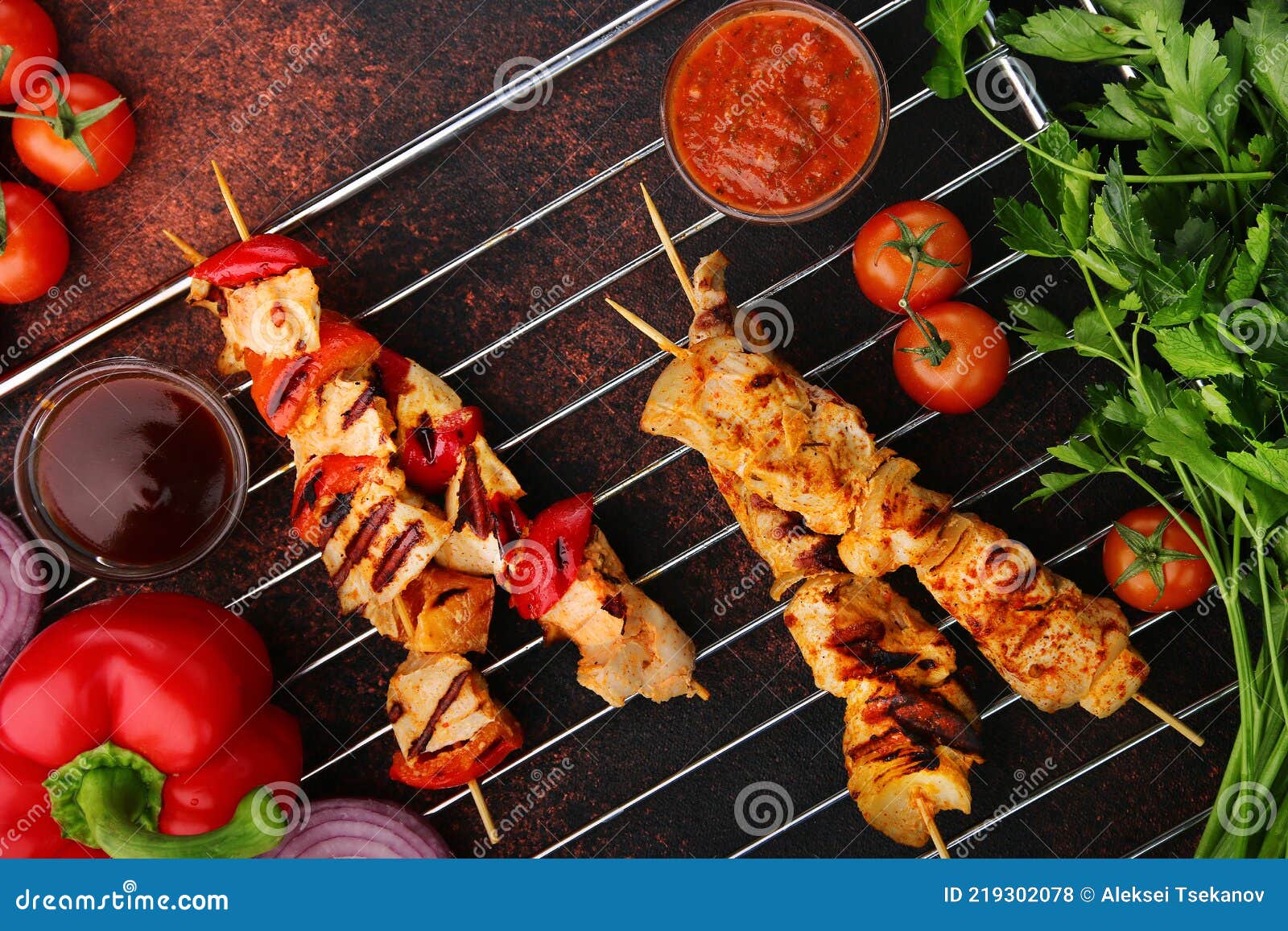 Barbecue on Skewer with Sauce and Vegetables on Table Top View. Bbq ...