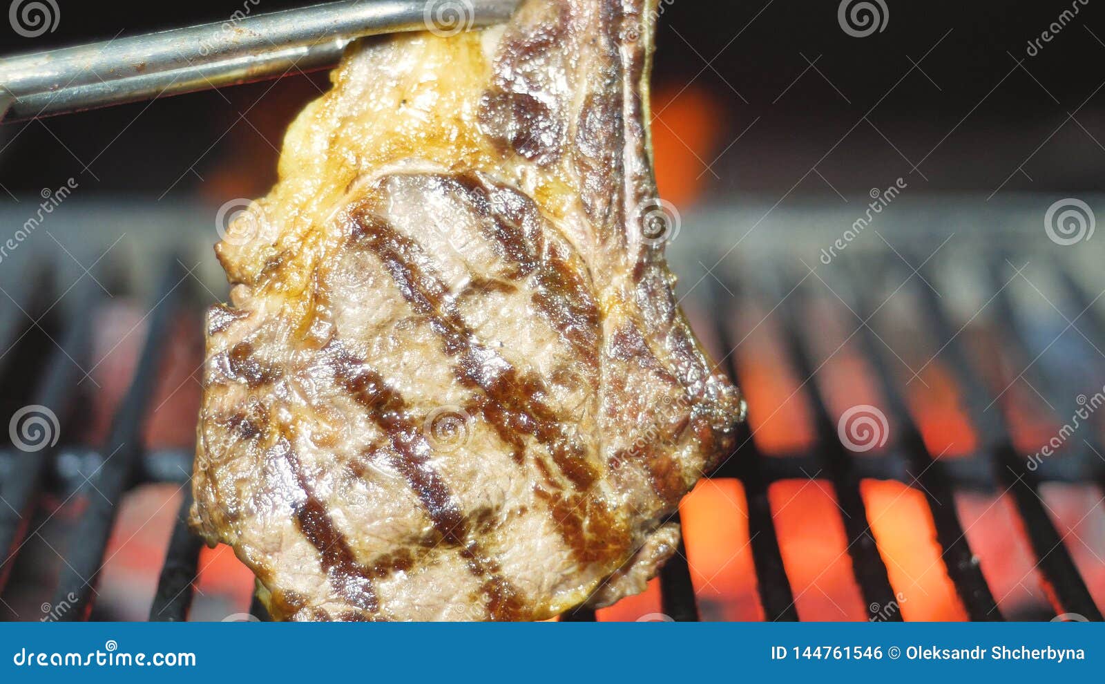 Barbecue Steak Cooking on the Grill in the Kitchen of the Restaurant ...