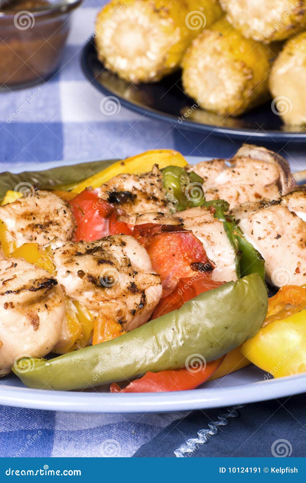Barbecued Chicken Kebab Dinner Stock Image - Image of napkin, yellow ...