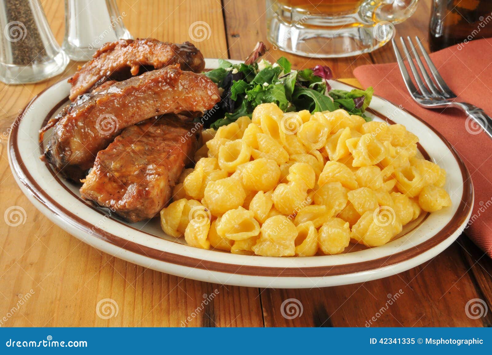 Barbecued Ribs with Macaroni and Cheese Stock Image - Image of meat ...