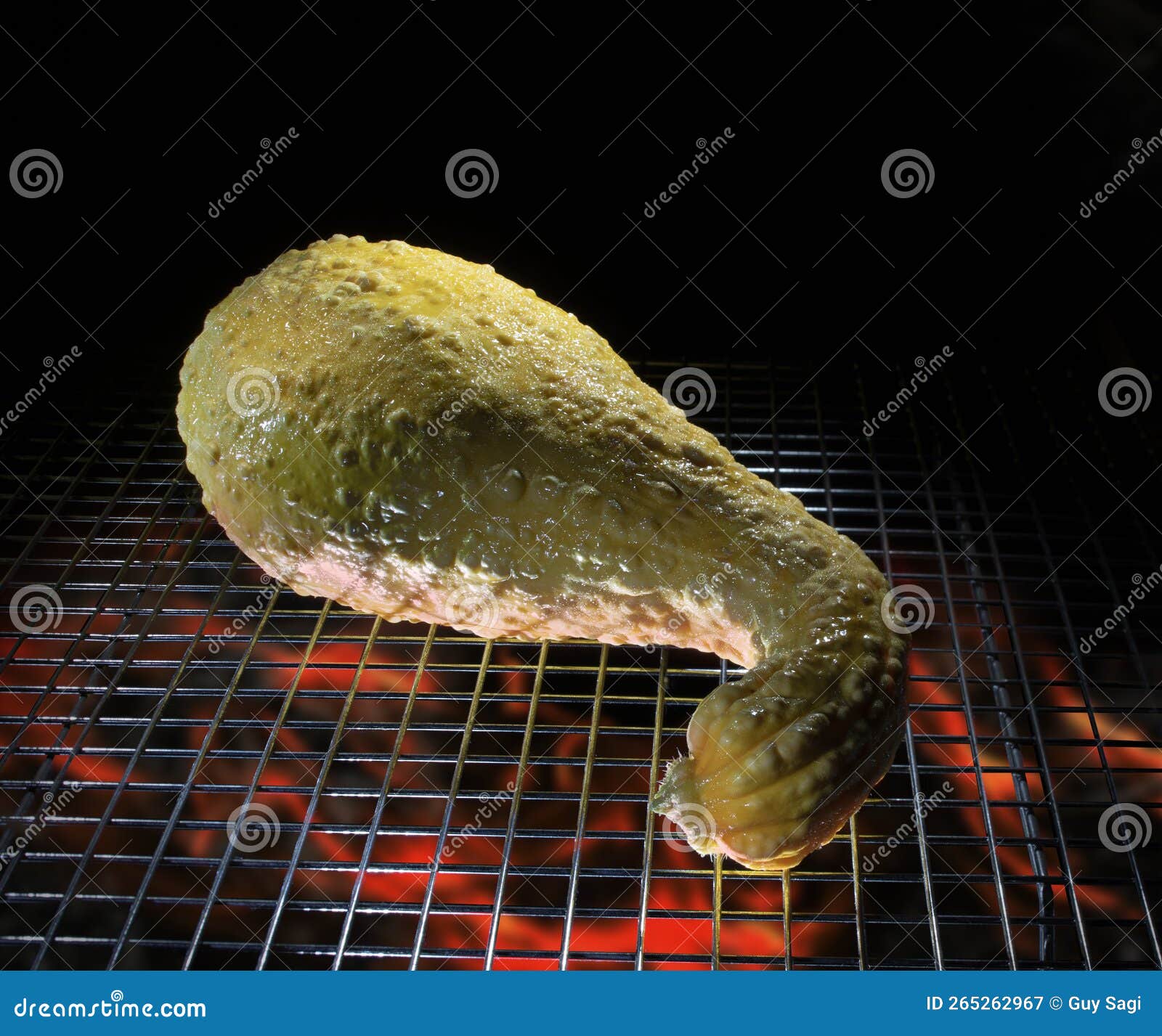 Barbecuing a yellow squash stock image. Image of cooking - 265262967