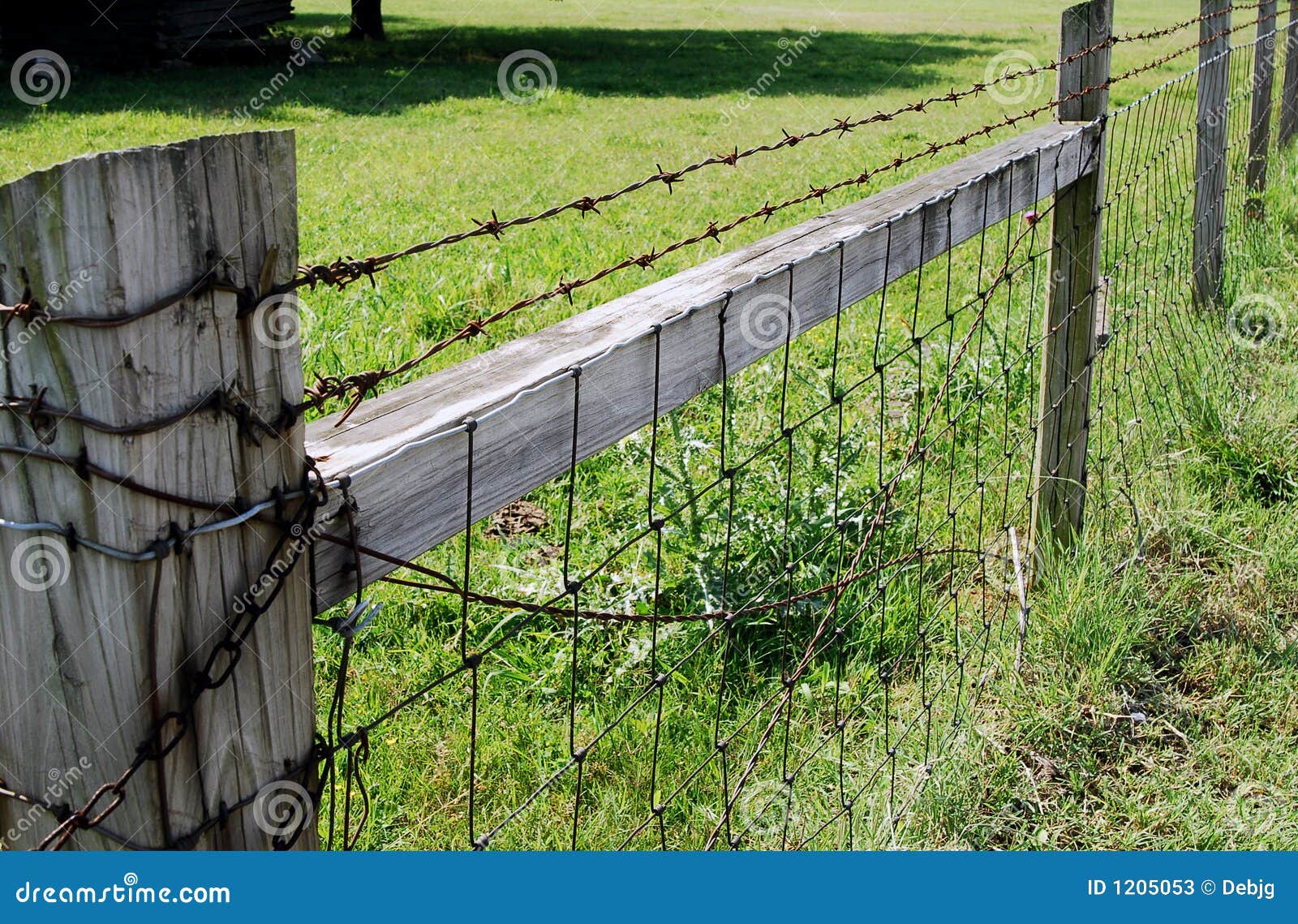 Barbed Fence Row stock image. Image of protection, private - 1205053