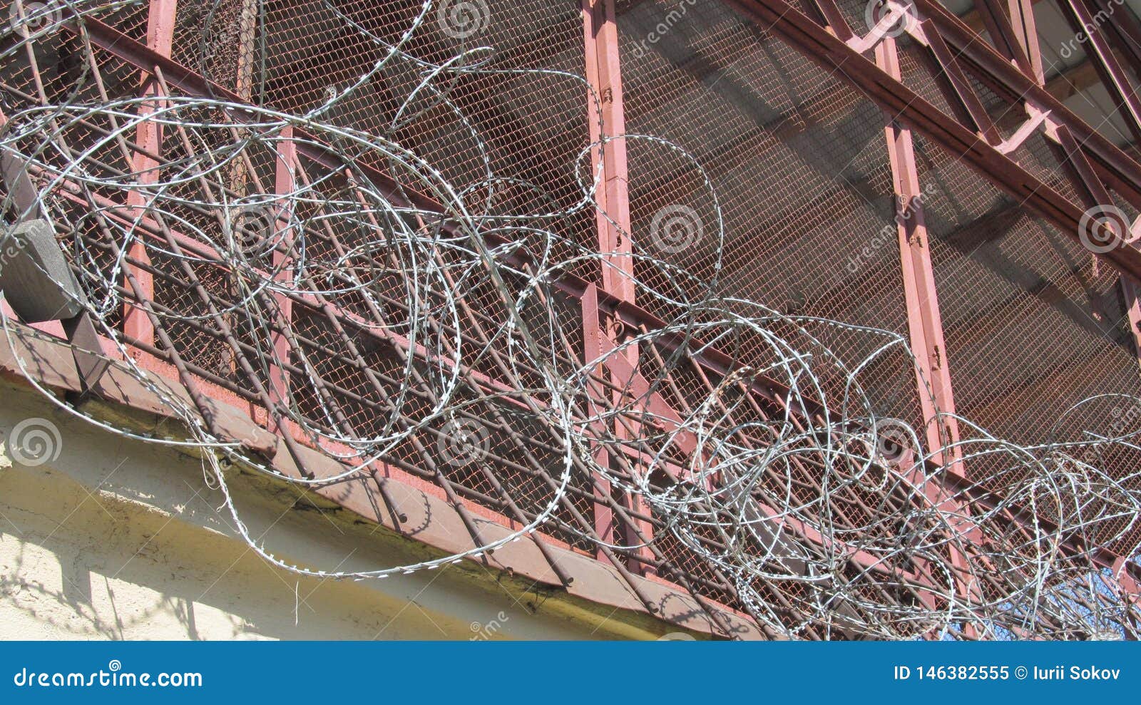 Barbed Wire on the Facade of the Building Stock Image - Image of facade ...