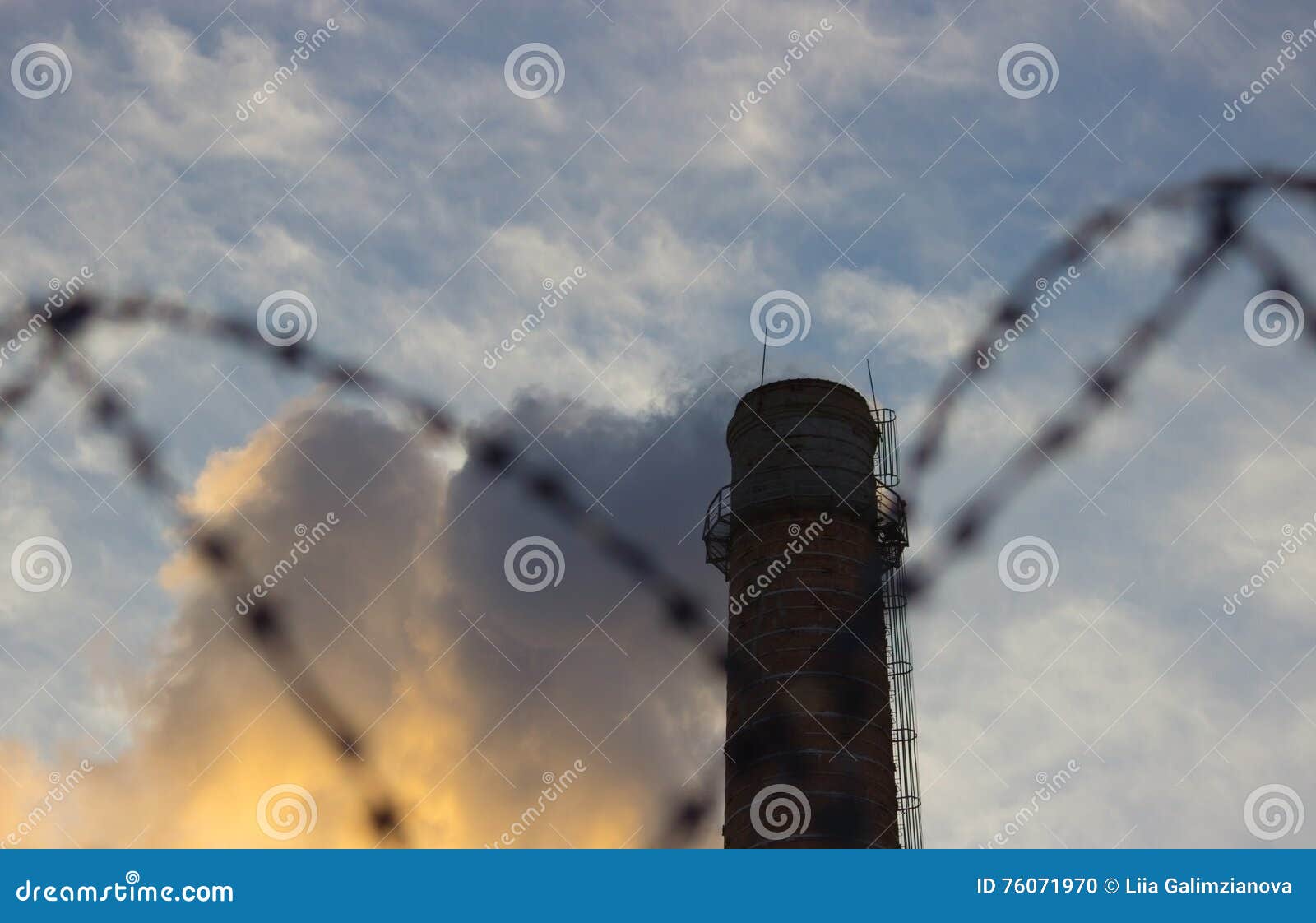 Barbed wire, factory pipe stock photo. Image of pipe - 76071970