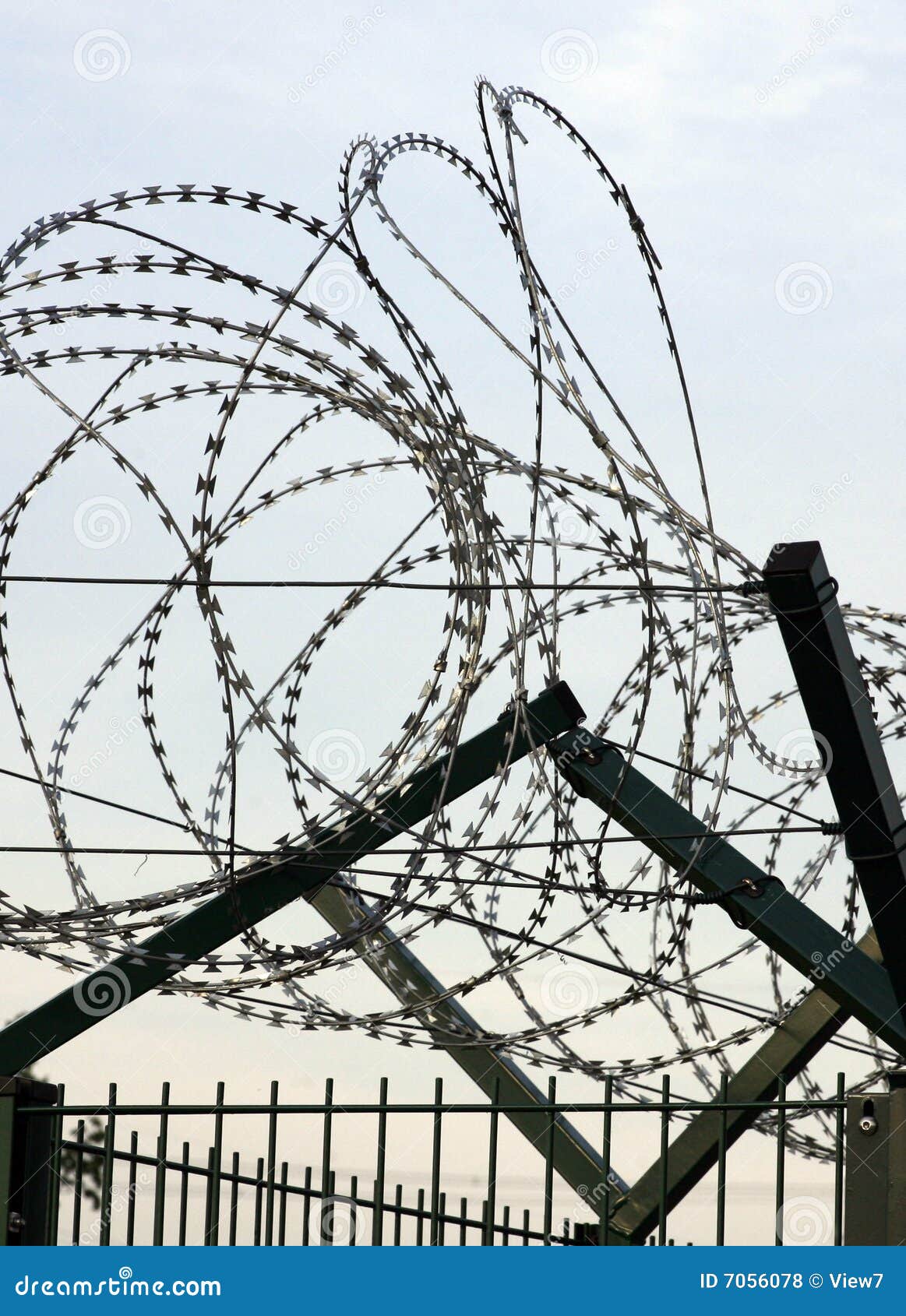 Barbed wire on fence stock photo. Image of hazard, post - 7056078
