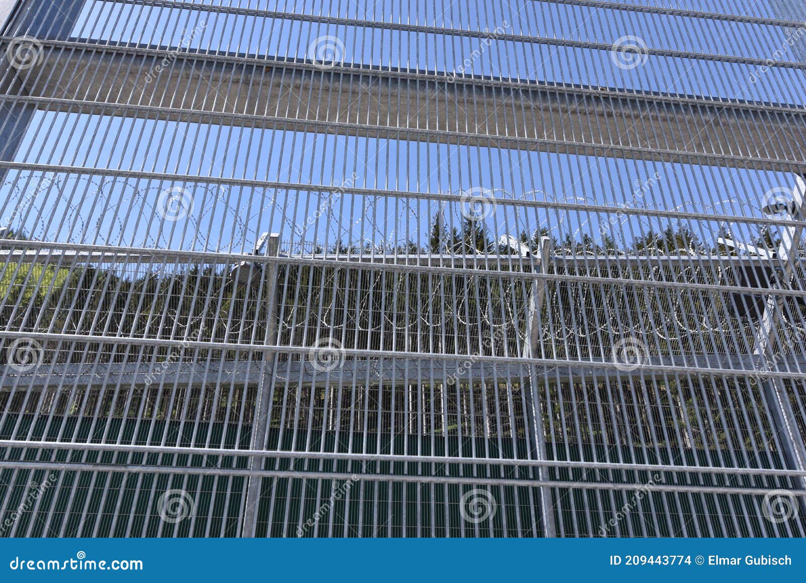 Barbed Wire Fence As Security Measurement in Prison Stock Photo - Image ...