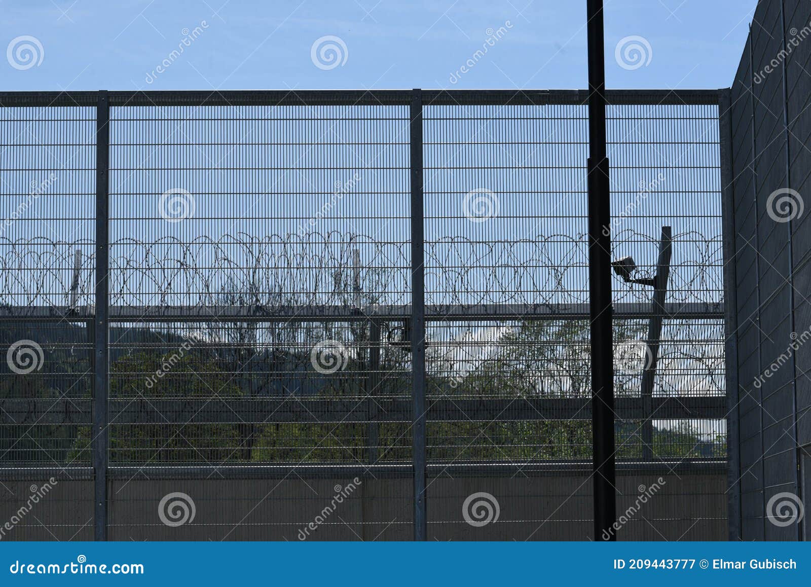 Barbed Wire Fence As Security Measurement in Prison Stock Image - Image ...