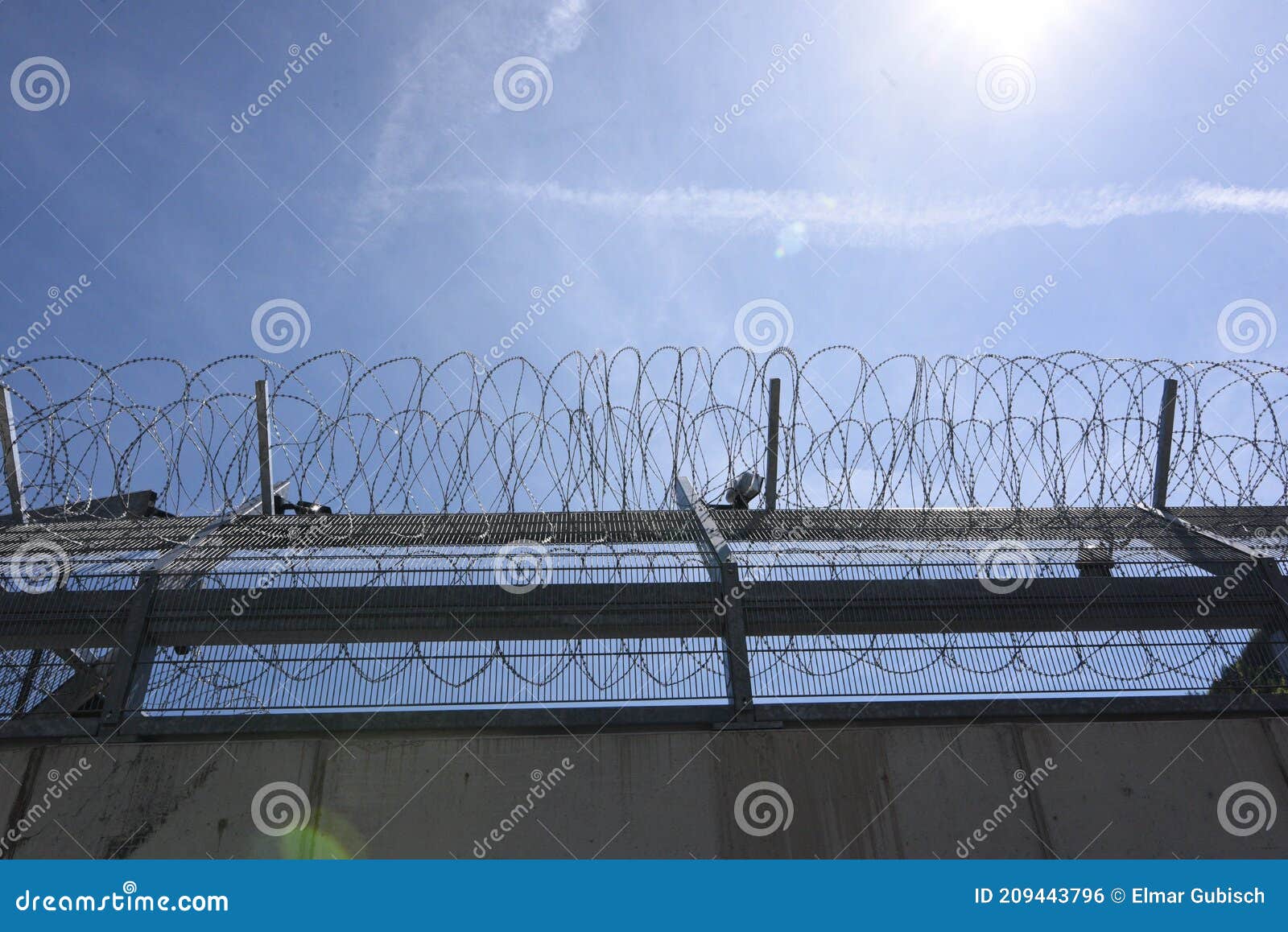 Barbed Wire Fence As Security Measurement in Prison Stock Photo - Image ...