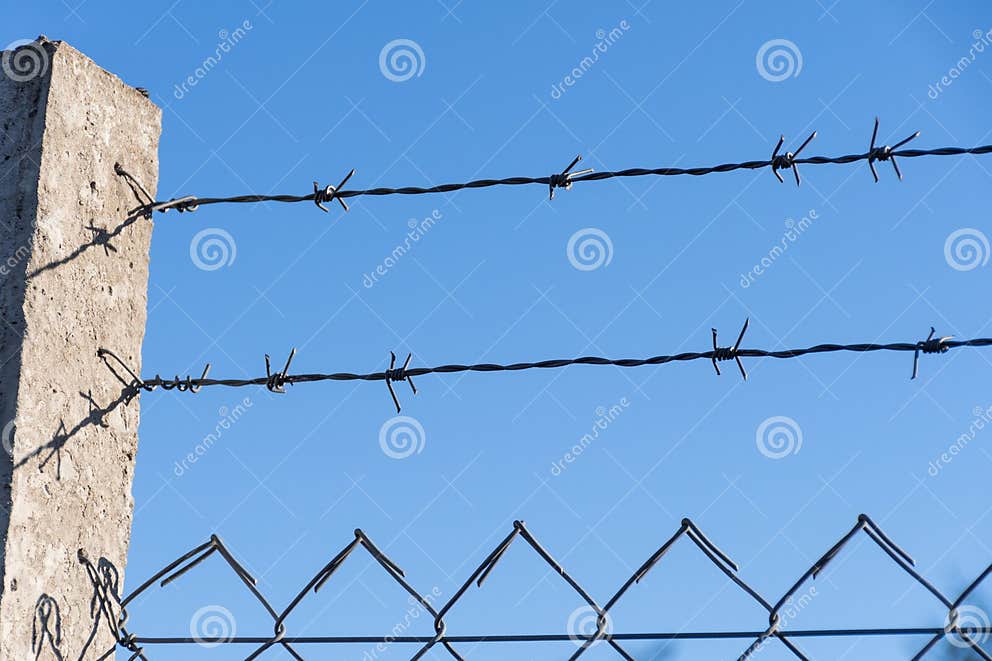 Barbed Wire Fence Connected To a Column. Stock Photo - Image of barb ...