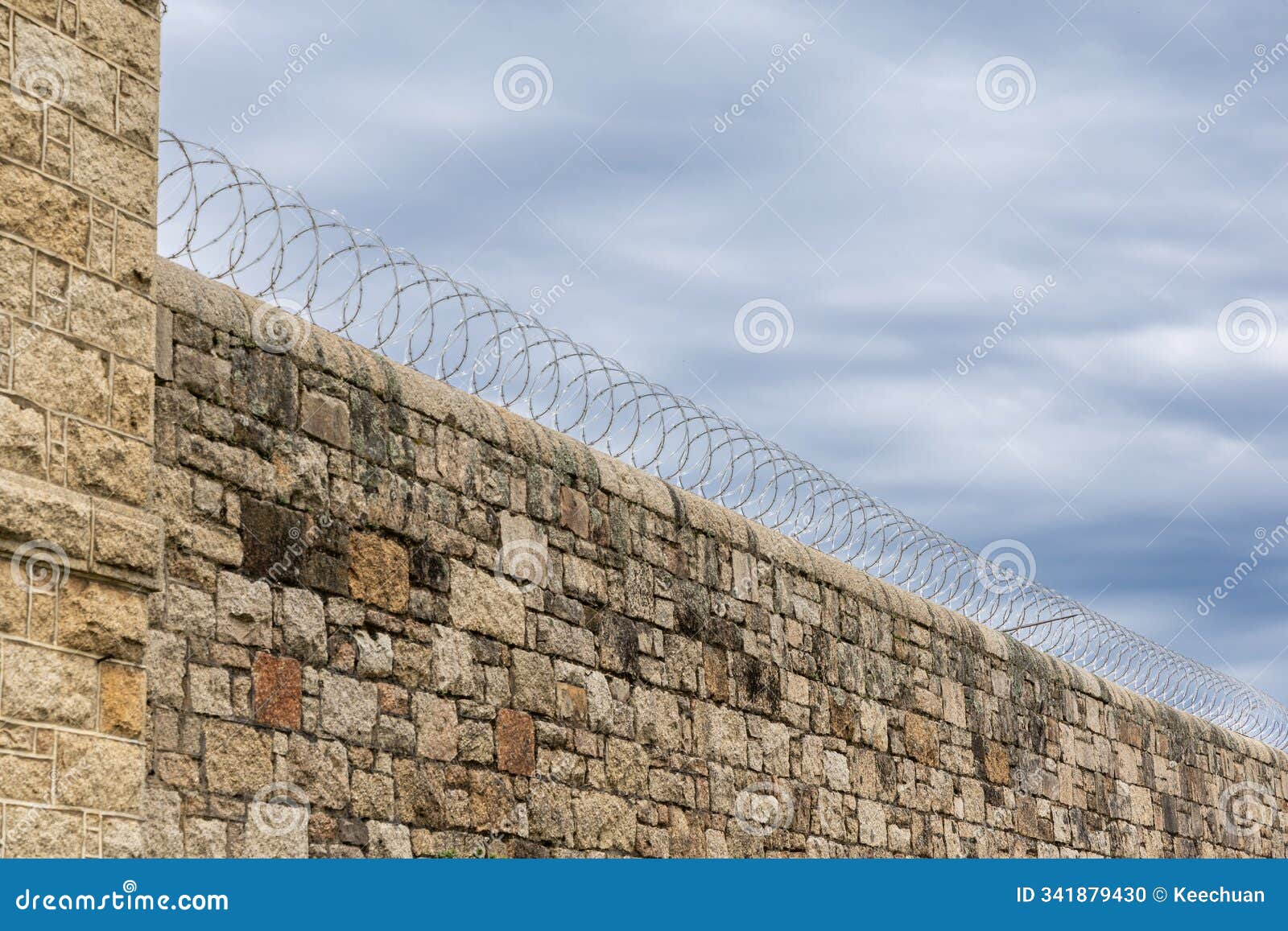 Barbed Wire Fence on High Wall Perimeter for Security and Protection ...