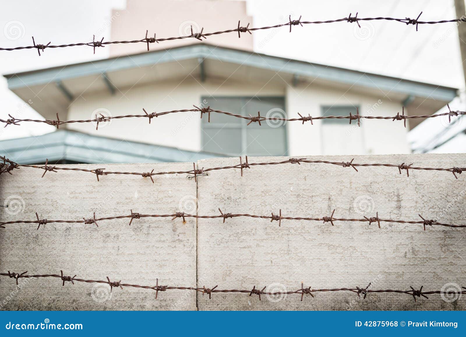 Barbed wire fence and home stock photo. Image of historic - 42875968