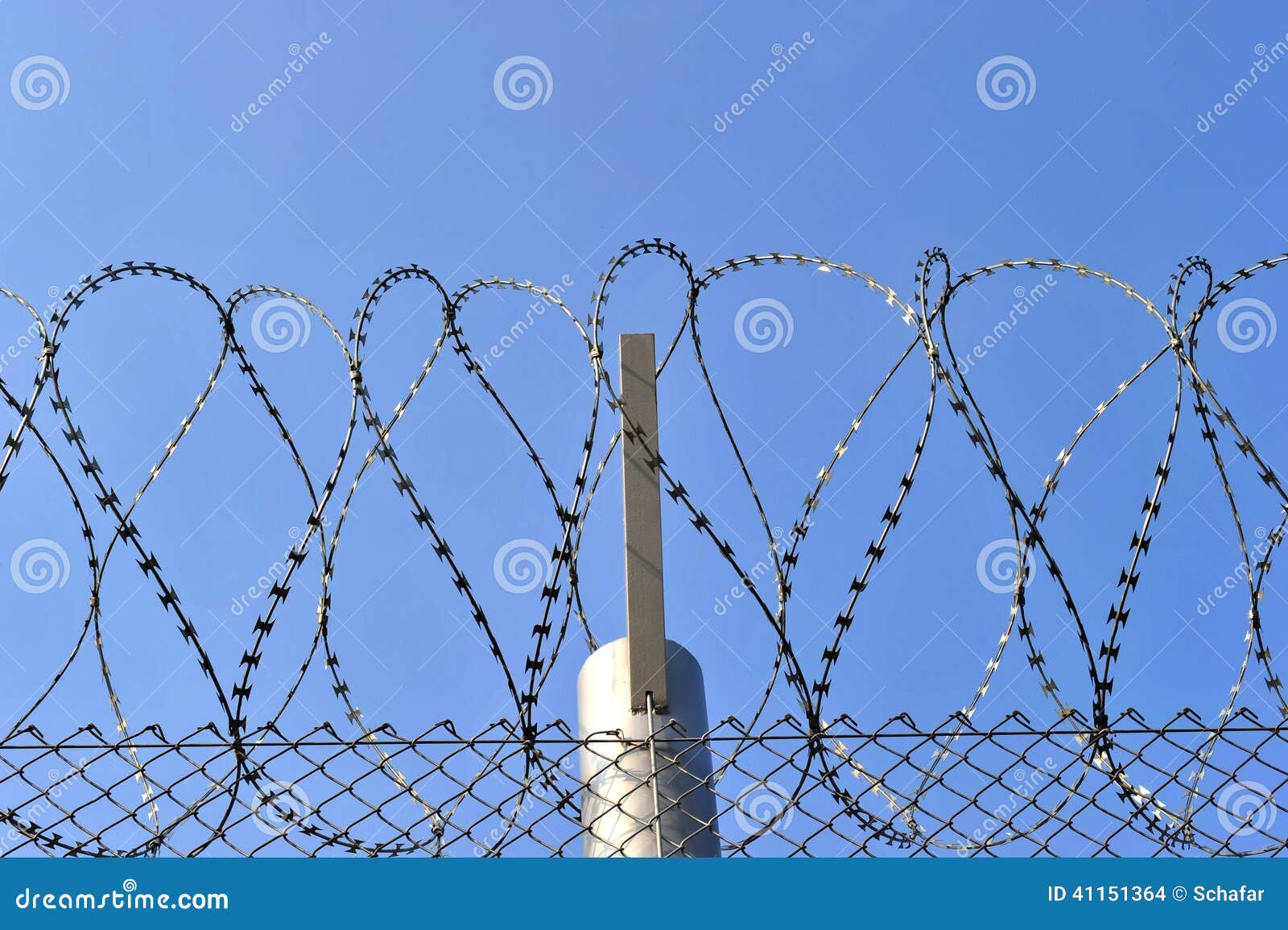 A Barbed Wire Fence with Razor Sharp Wires Stock Photo - Image of razor ...