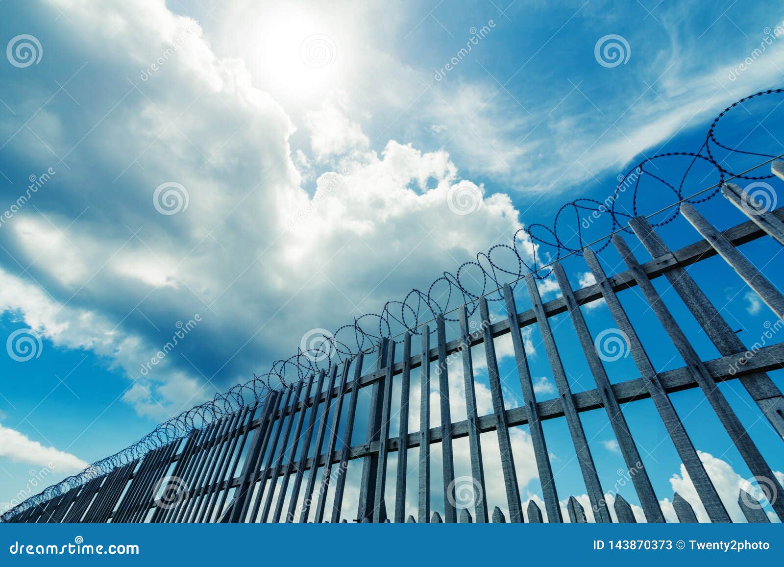 Barbed Wire Fence Surrounding a Prison , Military or Other High ...