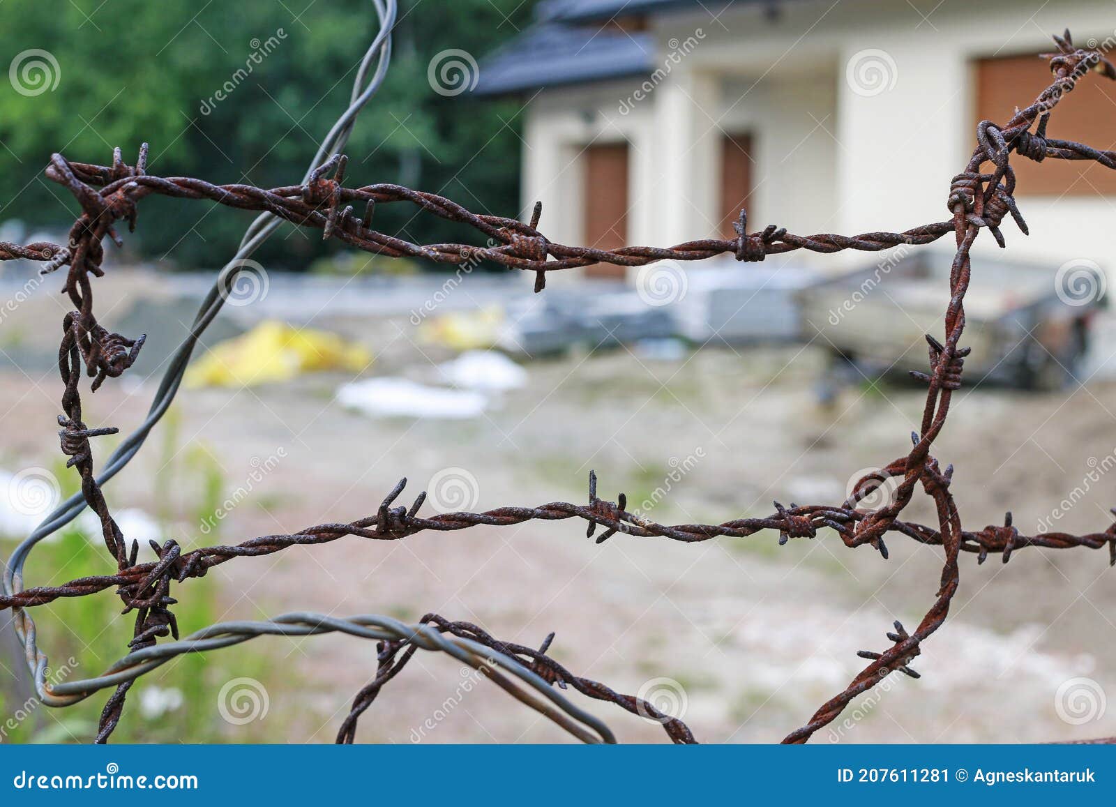 Barbed Wire in Front of the Building Stock Image - Image of estate ...