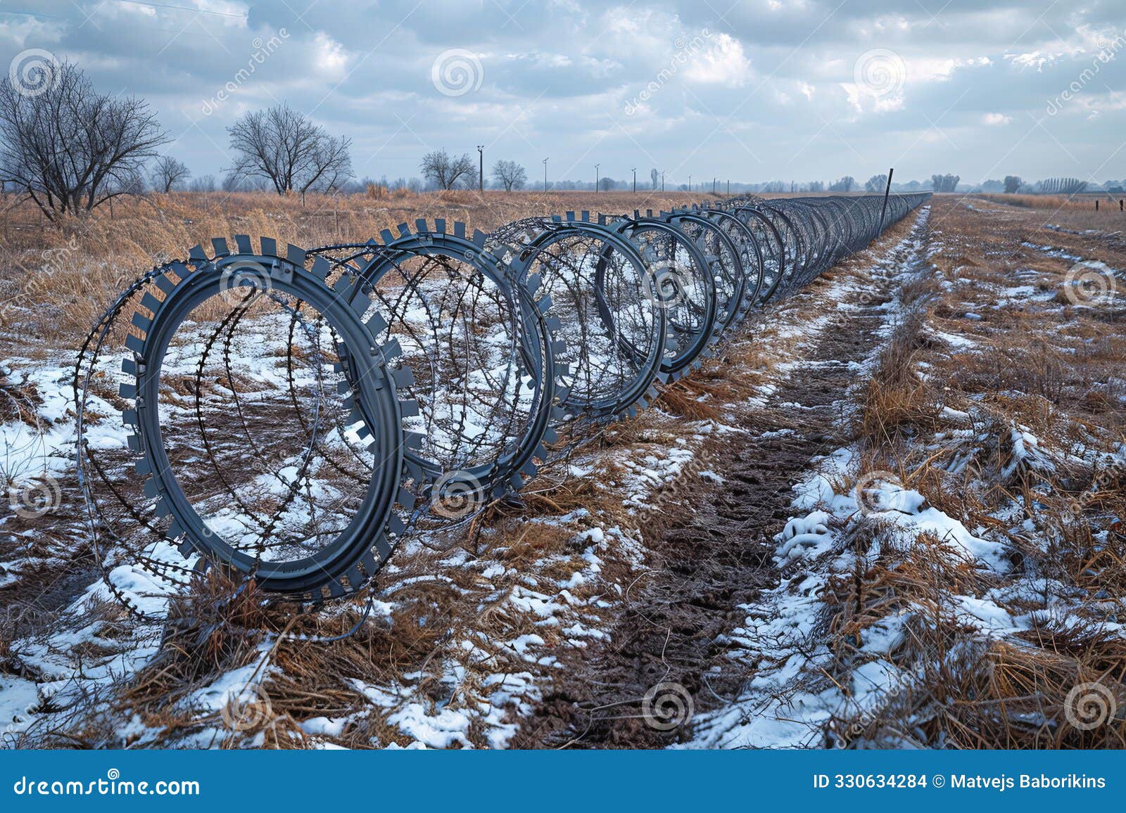 Barbed Wire Installation Machine Securing State Borders with Spiked ...
