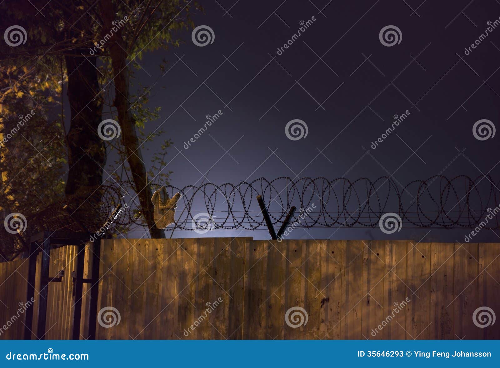 Barbed wire at night stock image. Image of enclosure - 35646293