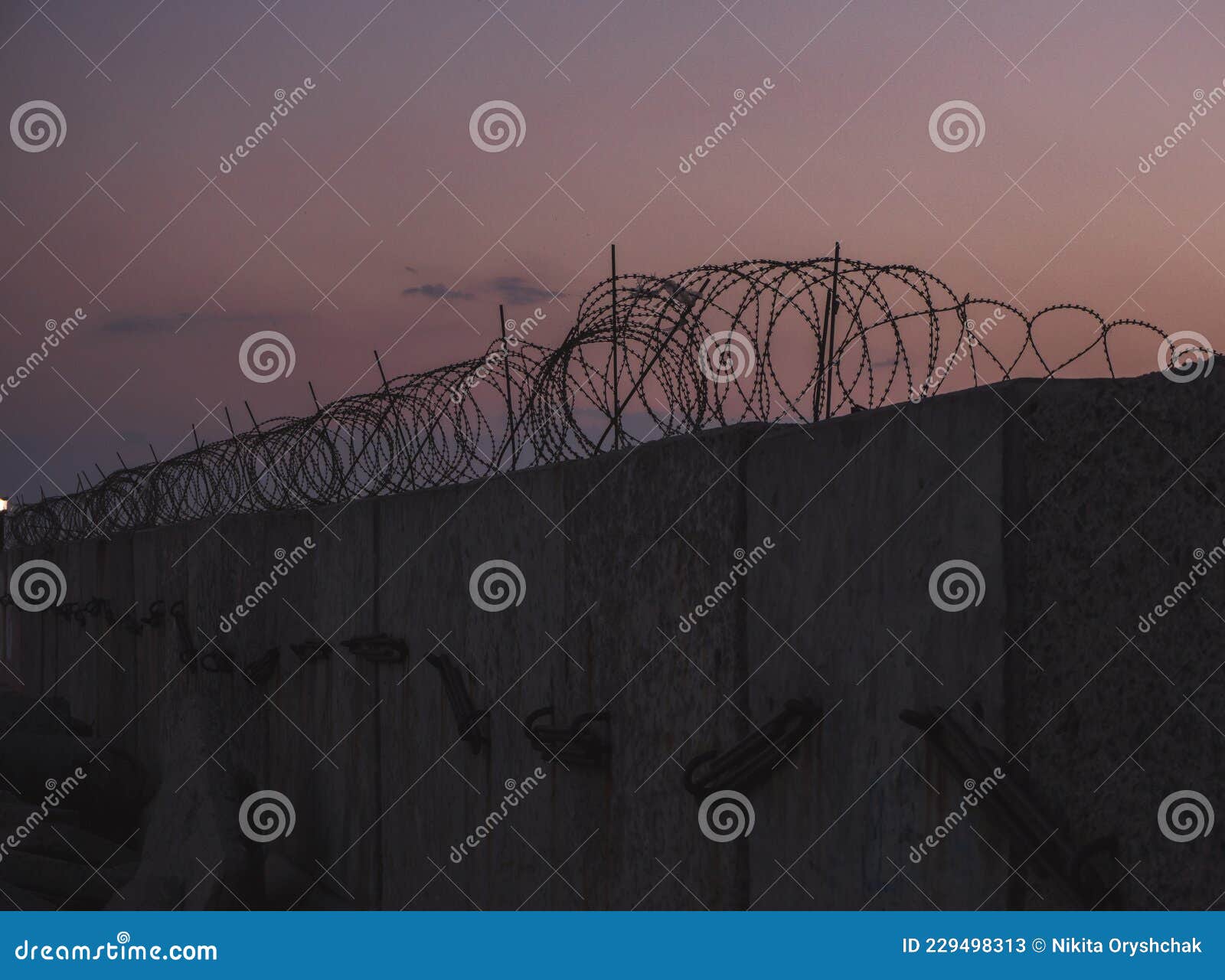 Barbed Wire Prison Wall. Sunset. Panorama. Stock Image - Image of ...