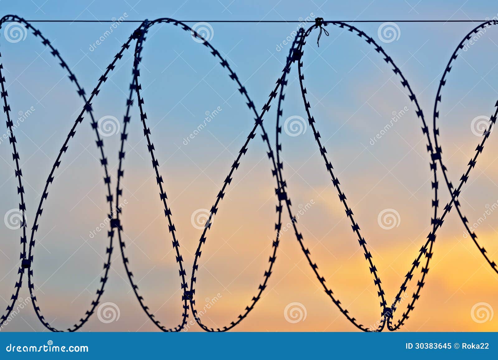Barbed wire a sunset stock image. Image of barbed, horizon - 30383645