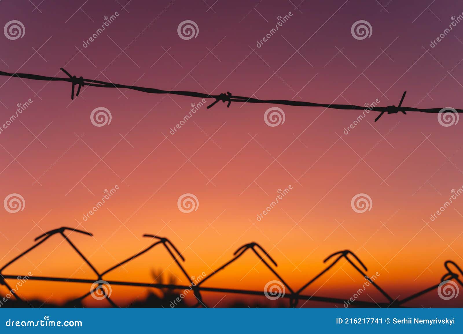 Barbed Wire on Sunset Sky Background - Shallow DOF, Focus on Foreground ...