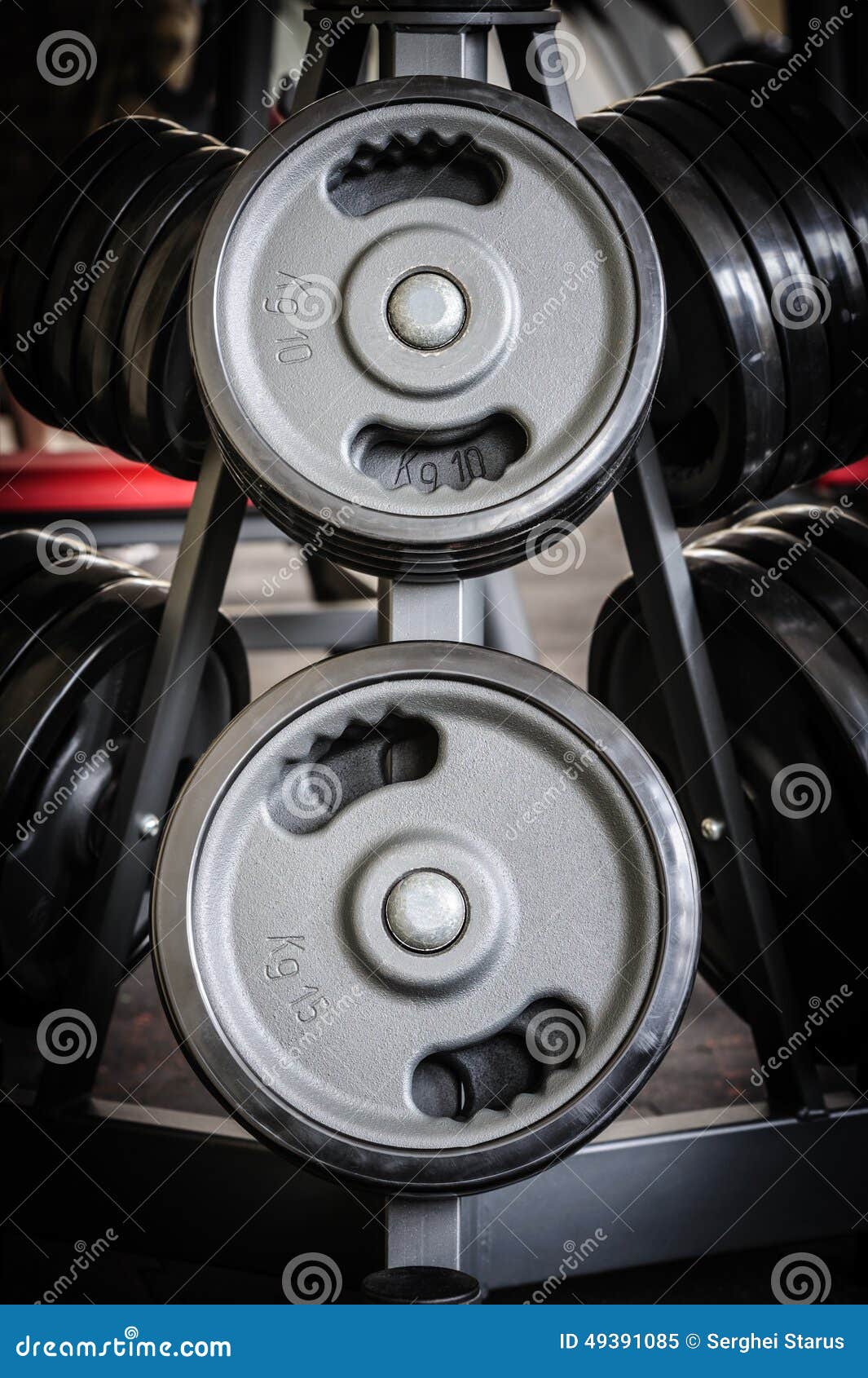 Barbell Plates Rack Royalty-Free Stock Photo | CartoonDealer.com #49391085