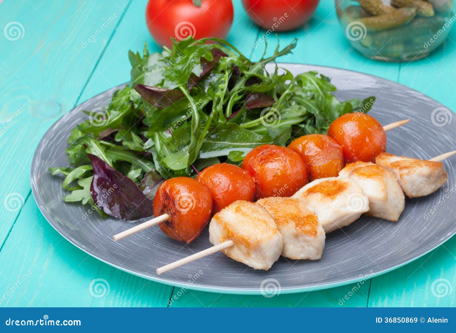 Barbeque Chicken with Tomatoes in a Plate with Salad Stock Image ...