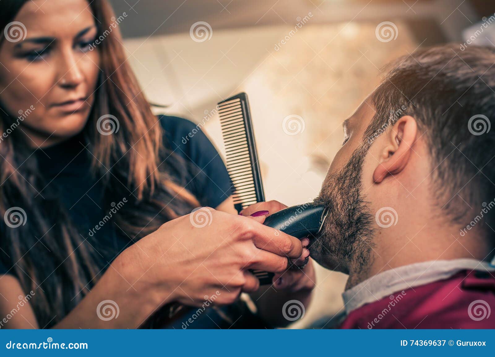 Barber Beard Cut a Client S Beard with Trimmer Stock Image - Image of ...