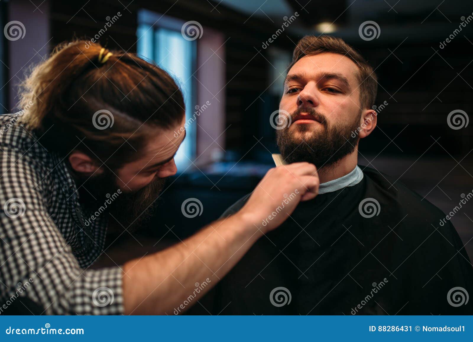 Barber Combing Beard of Client Man in Salon Cape Stock Image - Image of ...