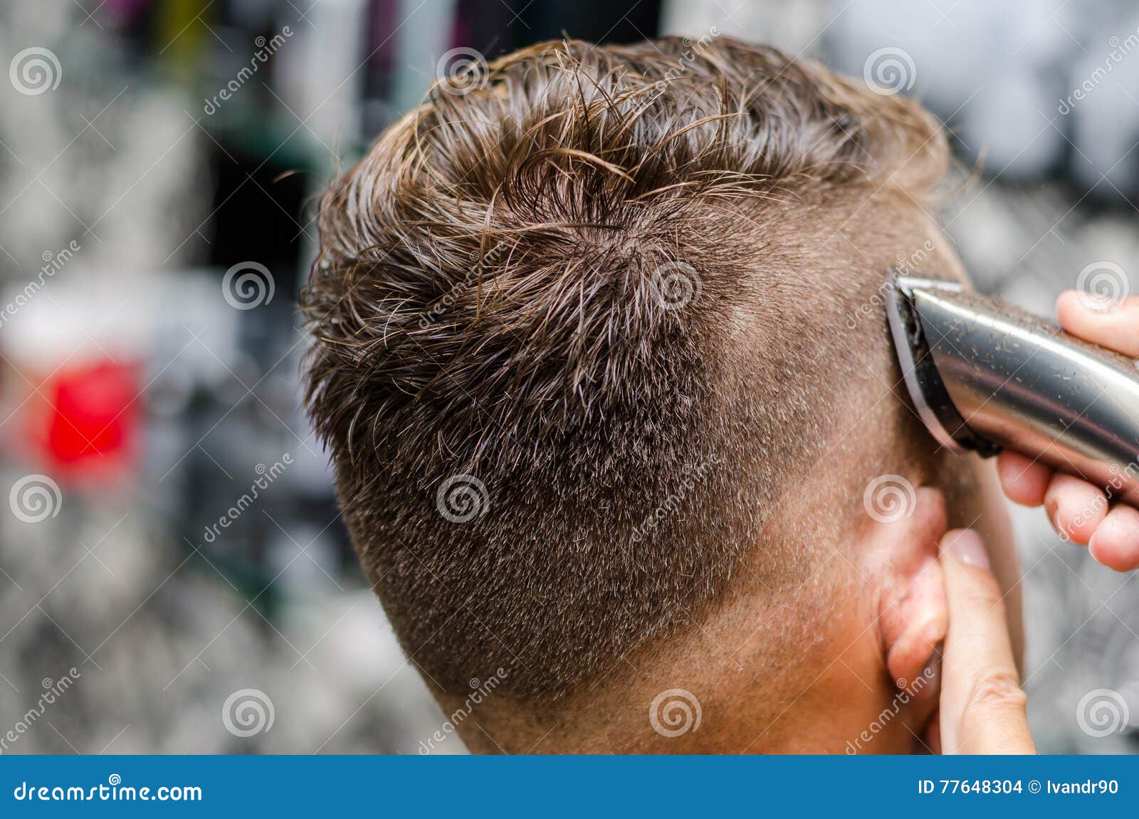 Barber Cutting and Modeling Hair by Electric Trimmer Stock Photo ...