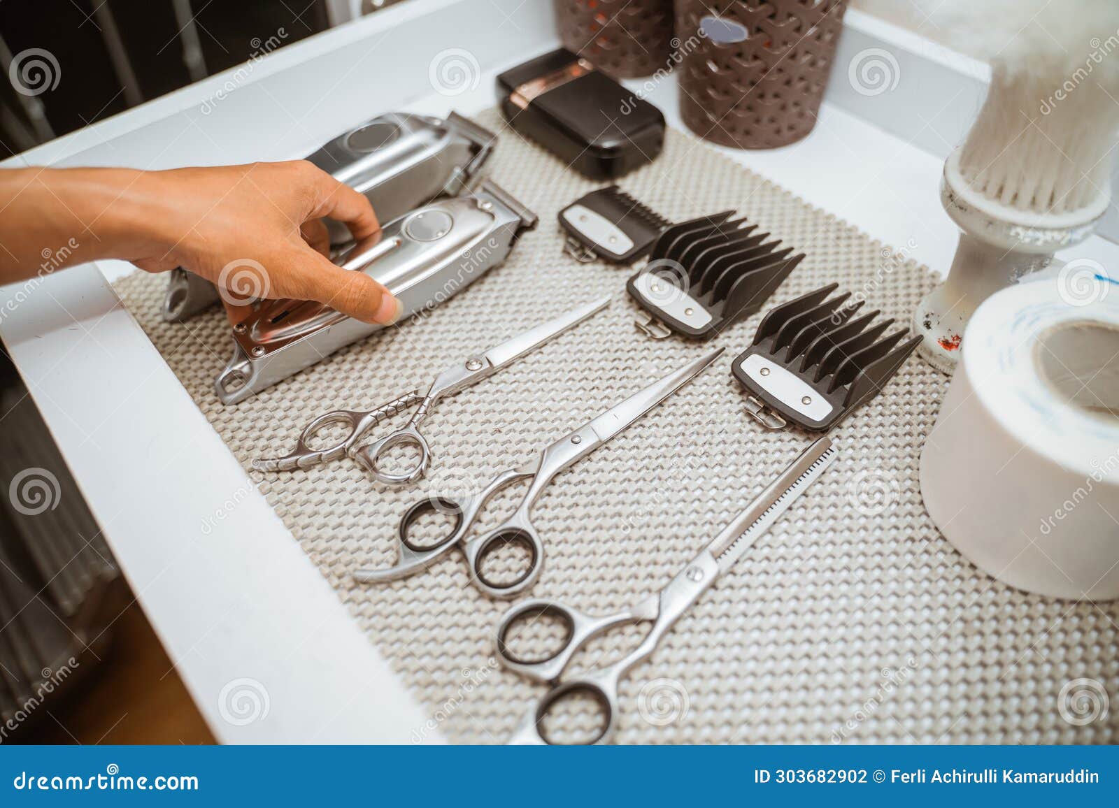 Barber Hand Picking an Haircut Instrument from Table Stock Photo ...