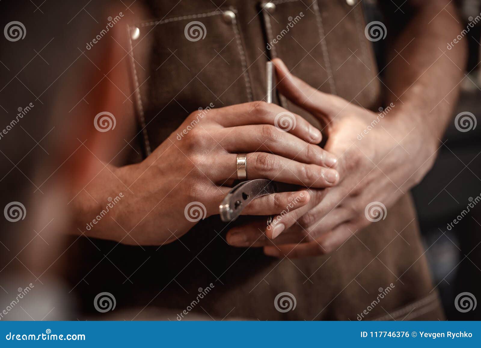 Barber`s Hand With A Clipper Cuts The Back Of A Man`s Neck. Haircuts In ...