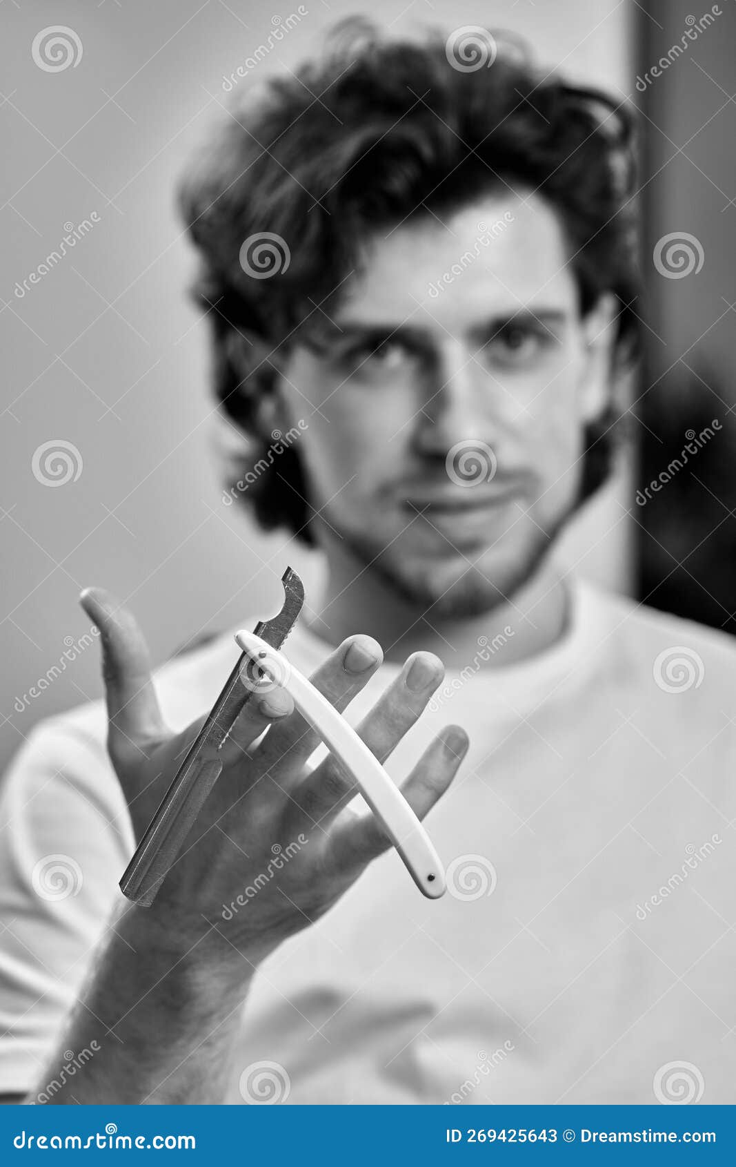 Barber Testing the Sharpness of Blade before Cutting. Stock Image ...