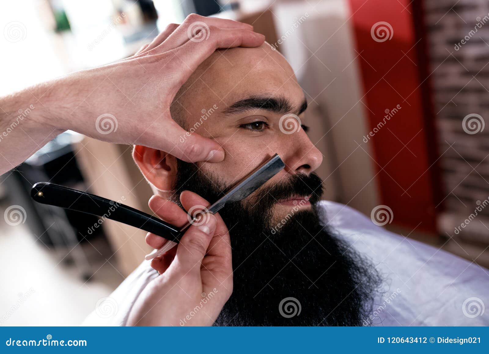 Barber a Man with a Beard in Process of Cutting Stock Photo - Image of ...