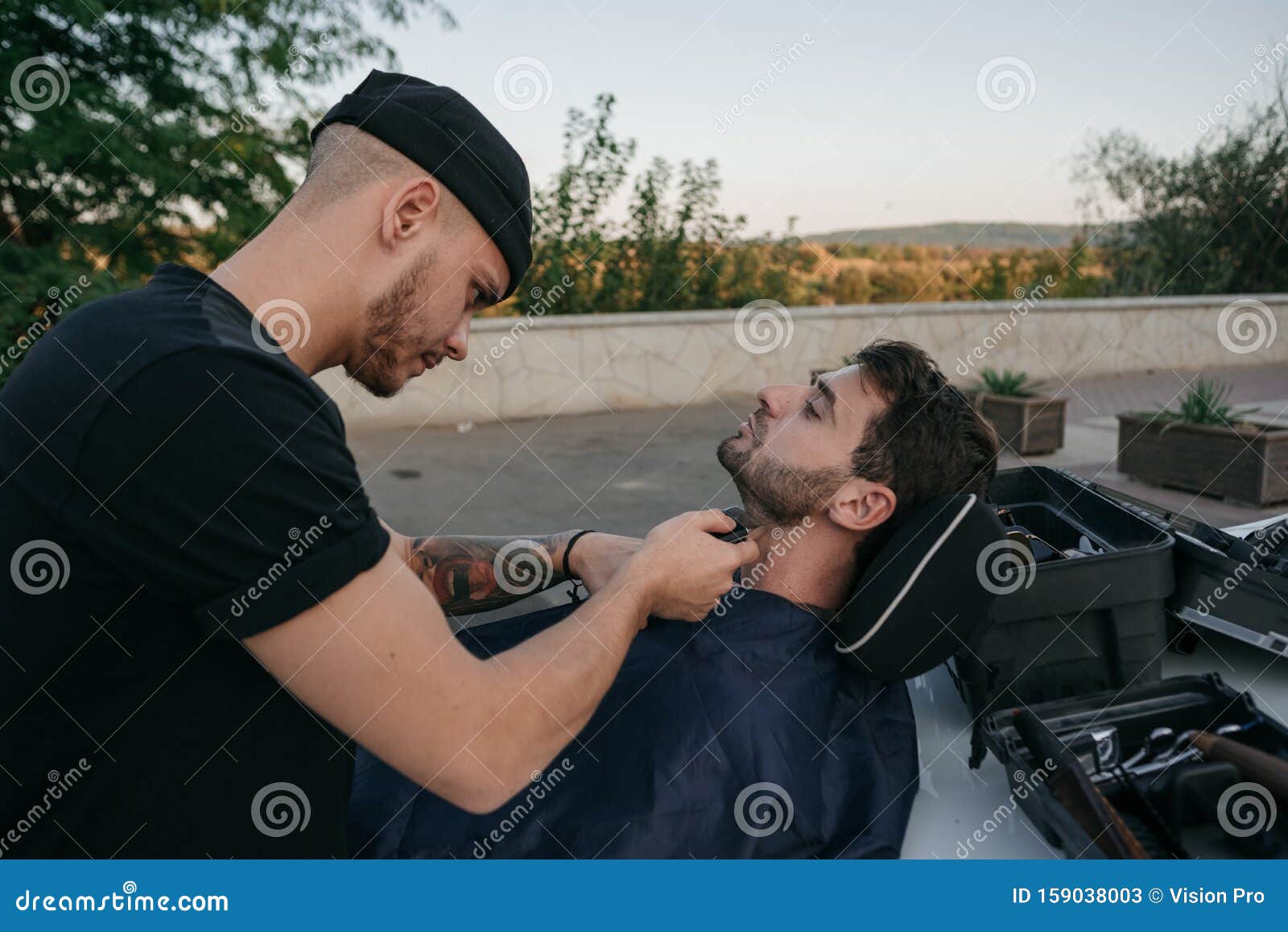 Barber Shaves Beard of Client Man on Chair an Open Air Stock Image ... Barber Shaves Beard of Client Man on Chair an Open Air Stock Image ...