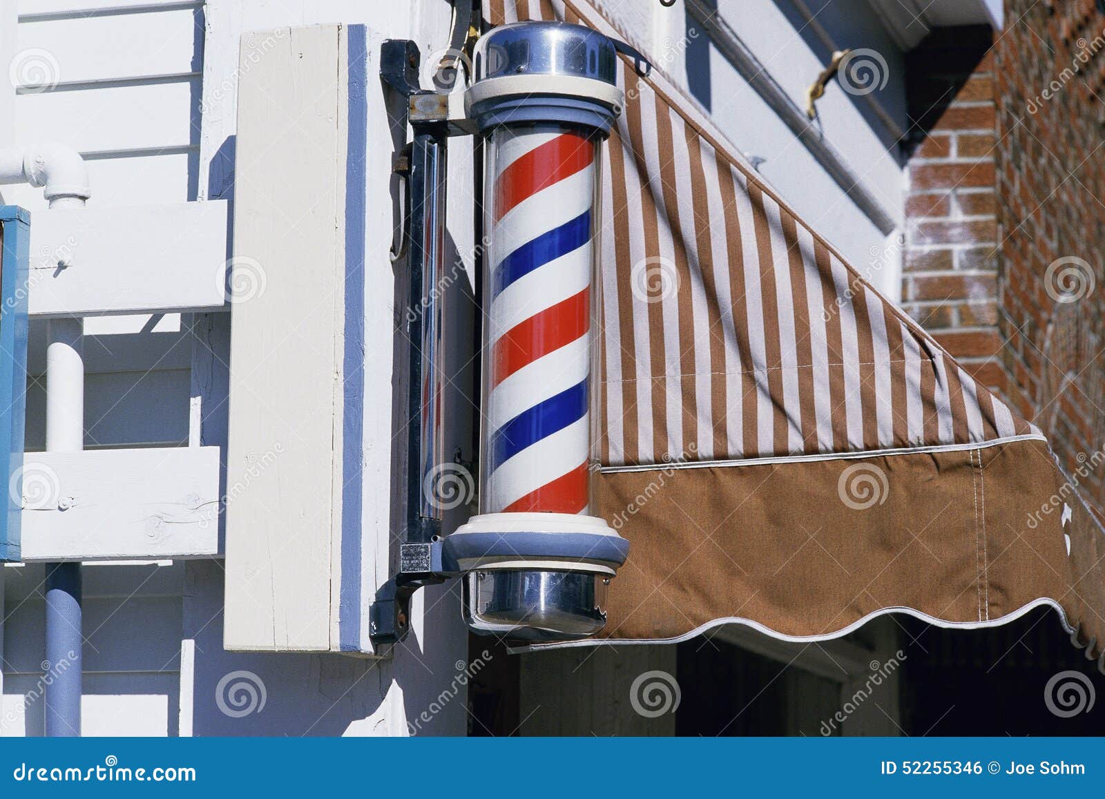 Barber shop pole stock photo. Image of main, tree, street - 52255346