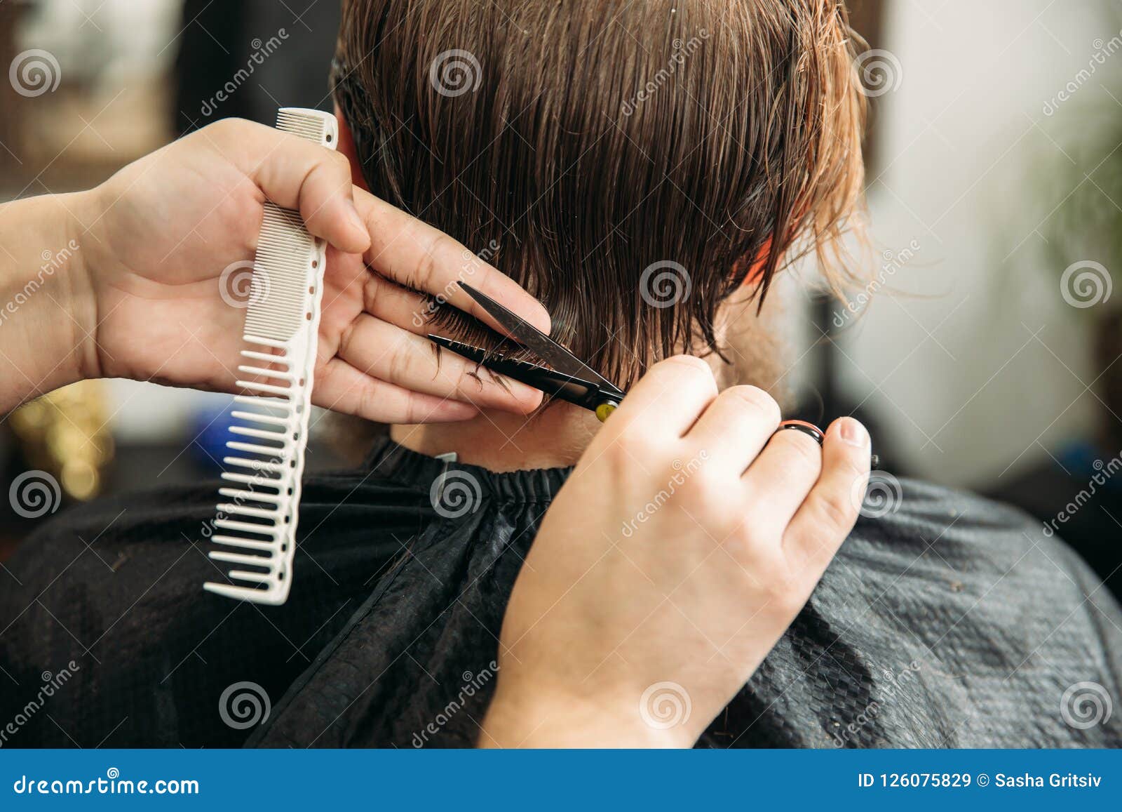 Barber Using Scissors and Comb in Barbershop Stock Image - Image of ...