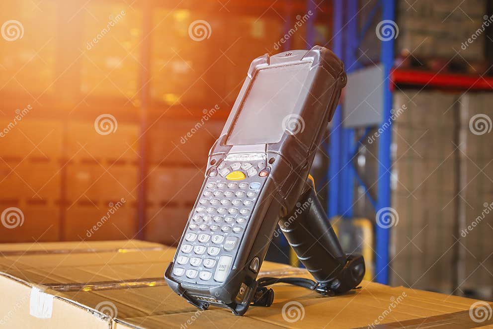 Barcode Scanner on Package Boxes in Storage Warehouse. Computer Work ...